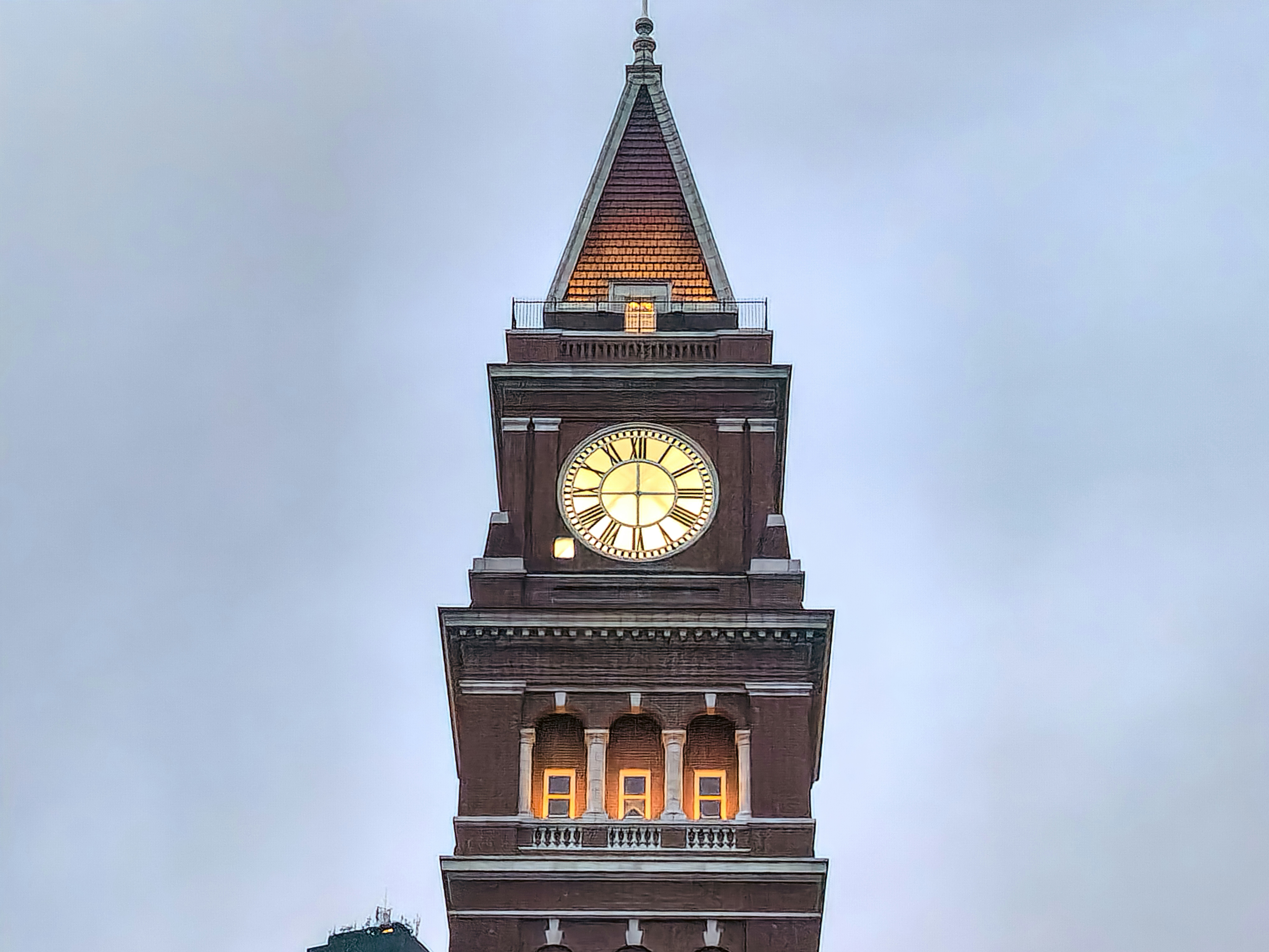 Timekeeper's Tower: A Brick Clock Tower Reaching Toward a Quiet Sky