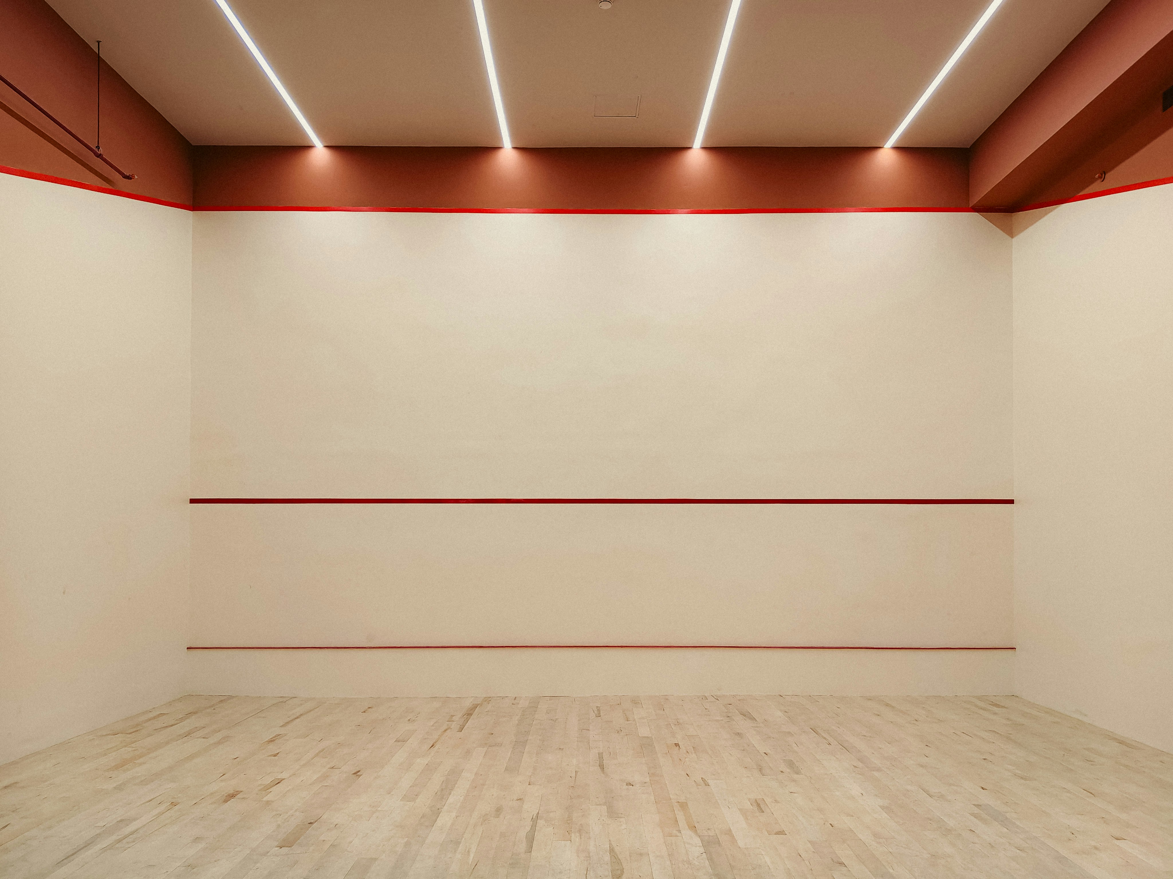 Empty squash court with red markings and lighting. photo – Free ...