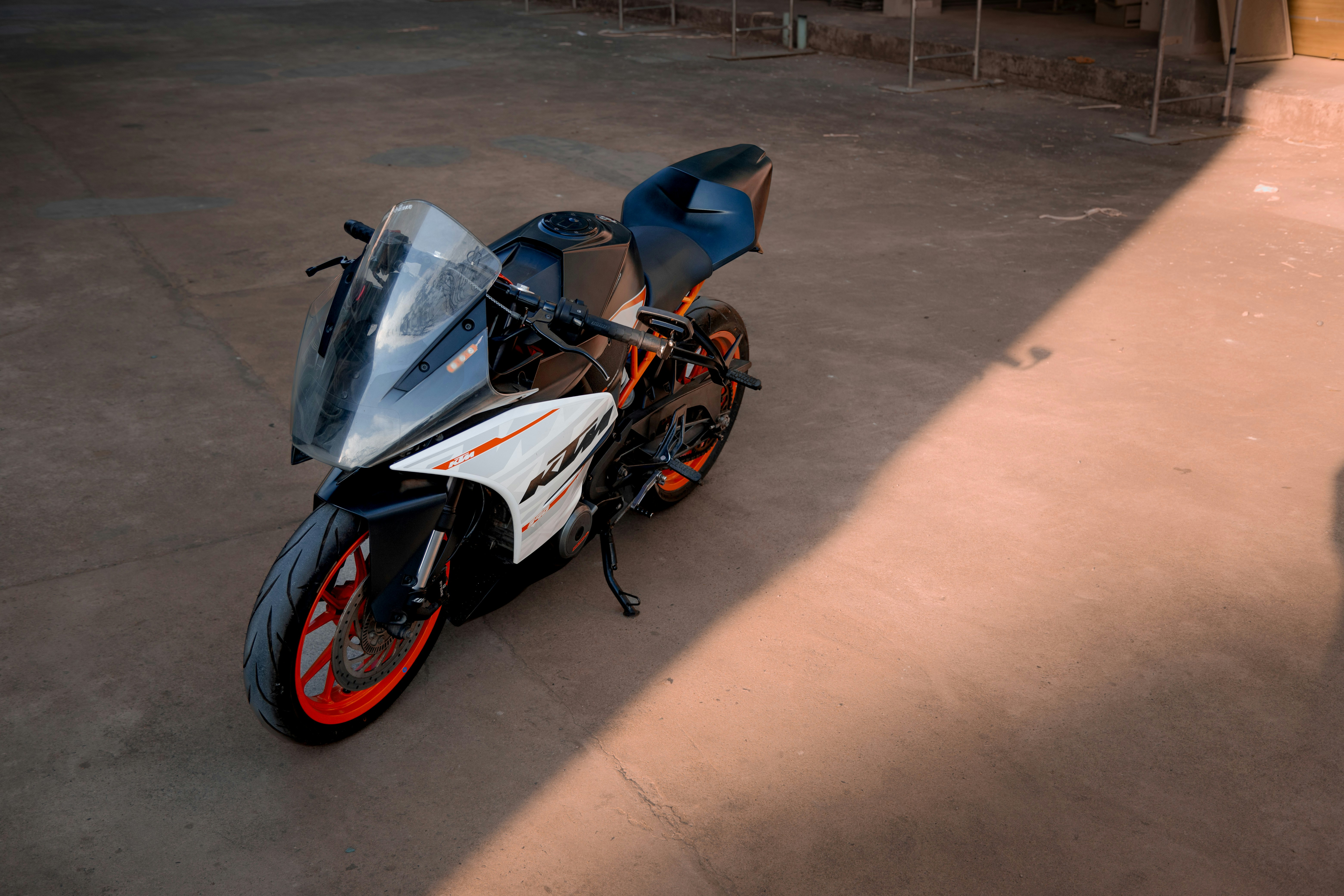 Diagonal Spark: A sportbike under a sharp diagonal shadow