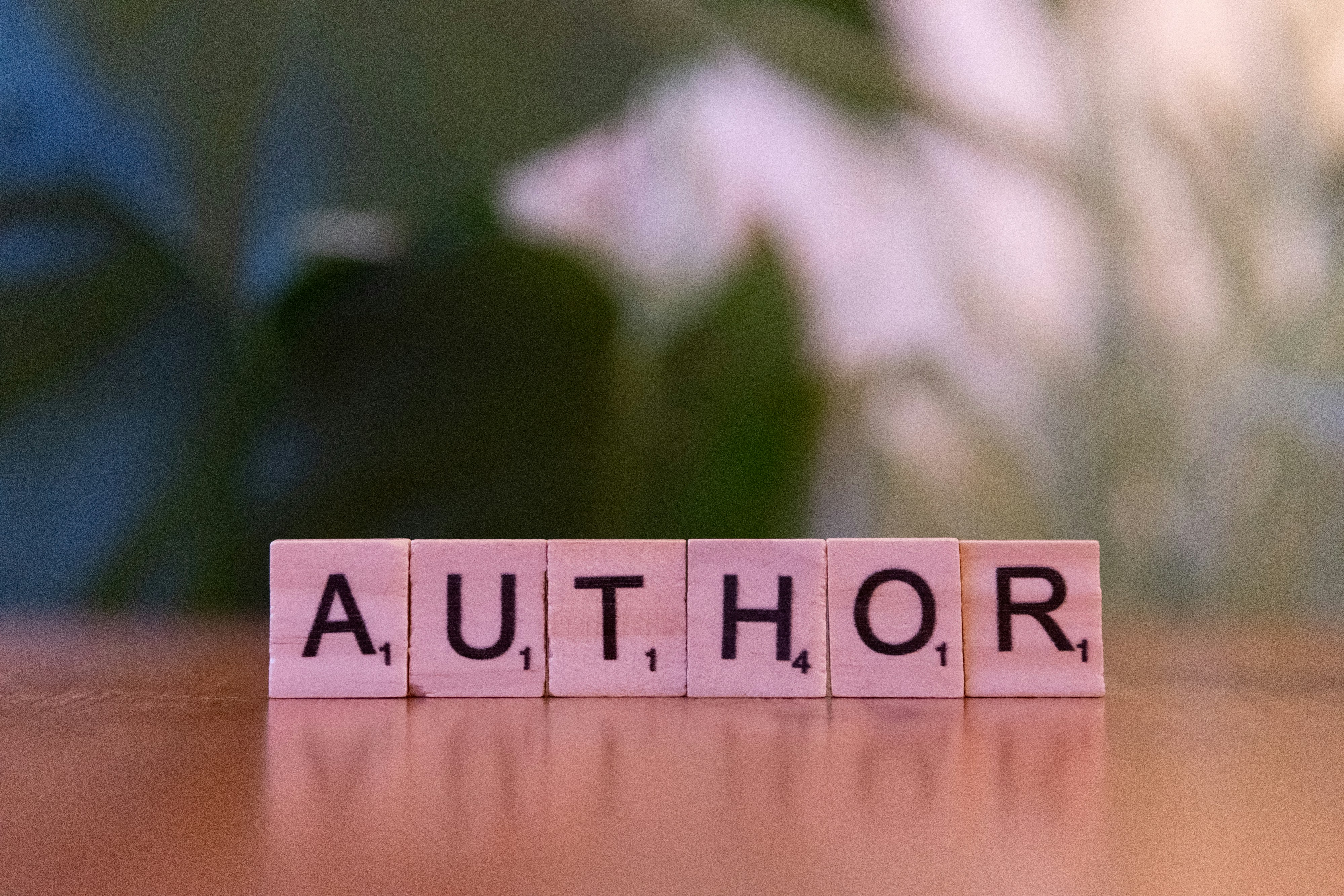 A scrabble type block spelling the word author photo – Free Symbol ...