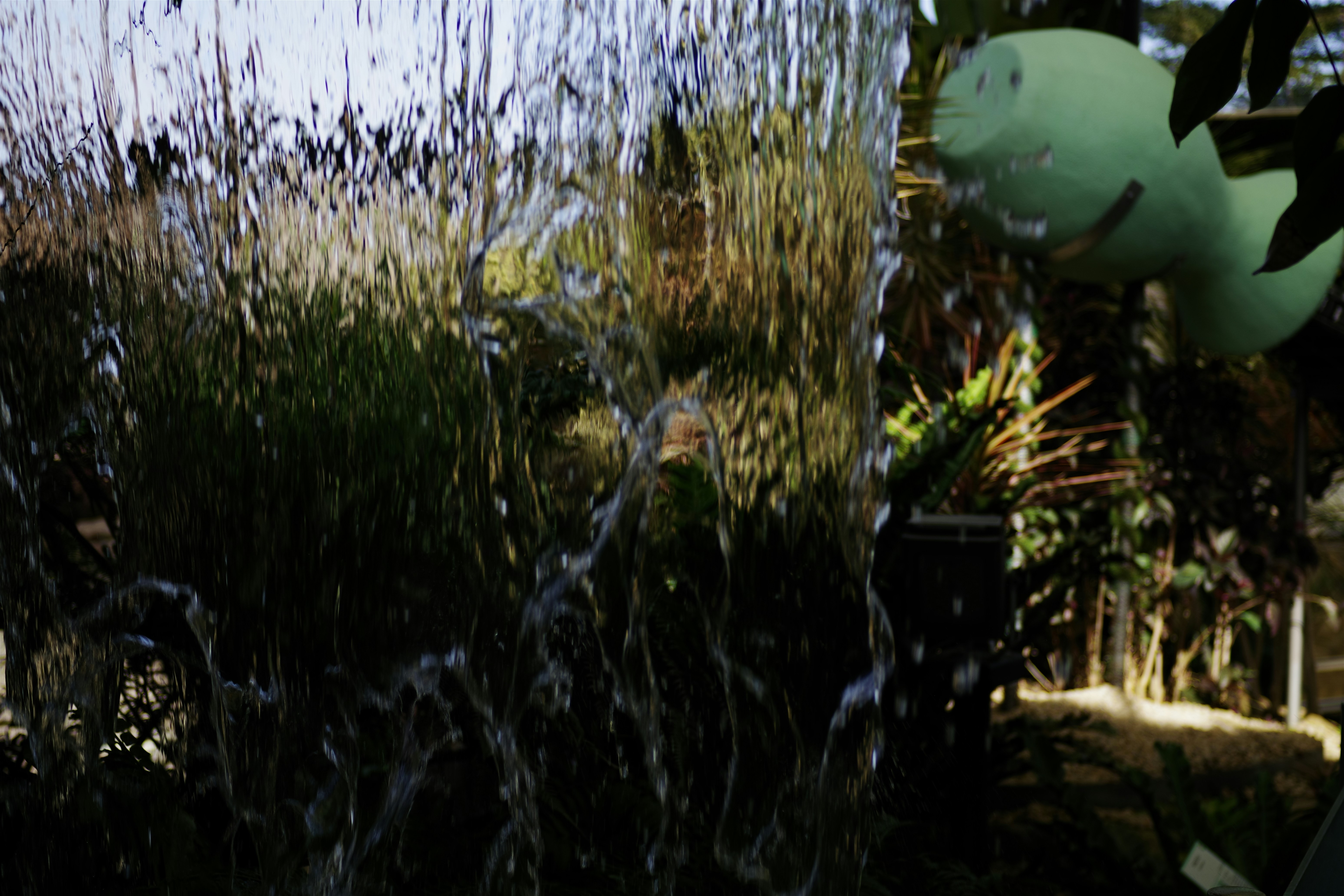 Fountain Veil: Light and Motion Through a Glassy Cascade