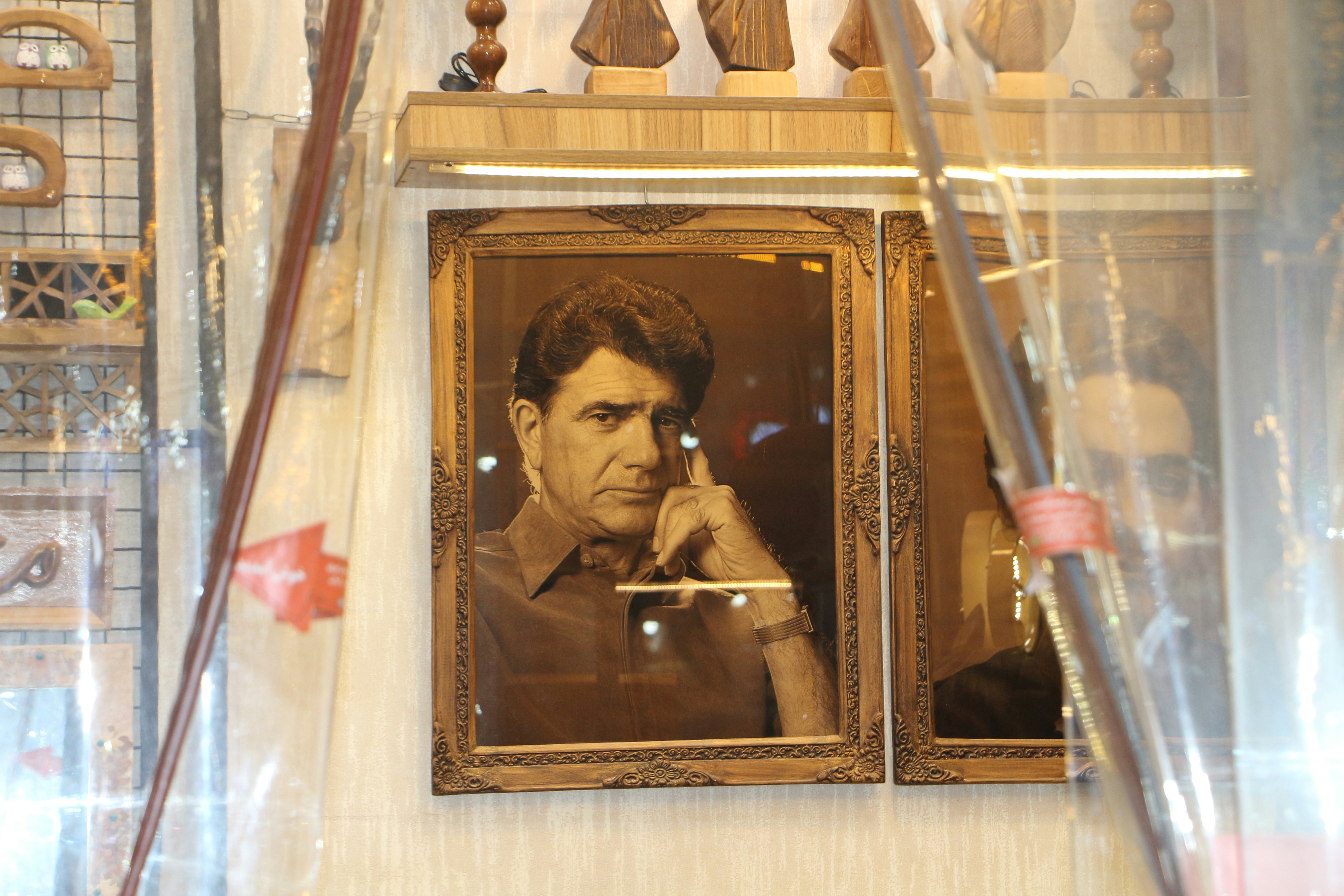 Framed Portrait Behind Glass: A Quiet Gallery Moment