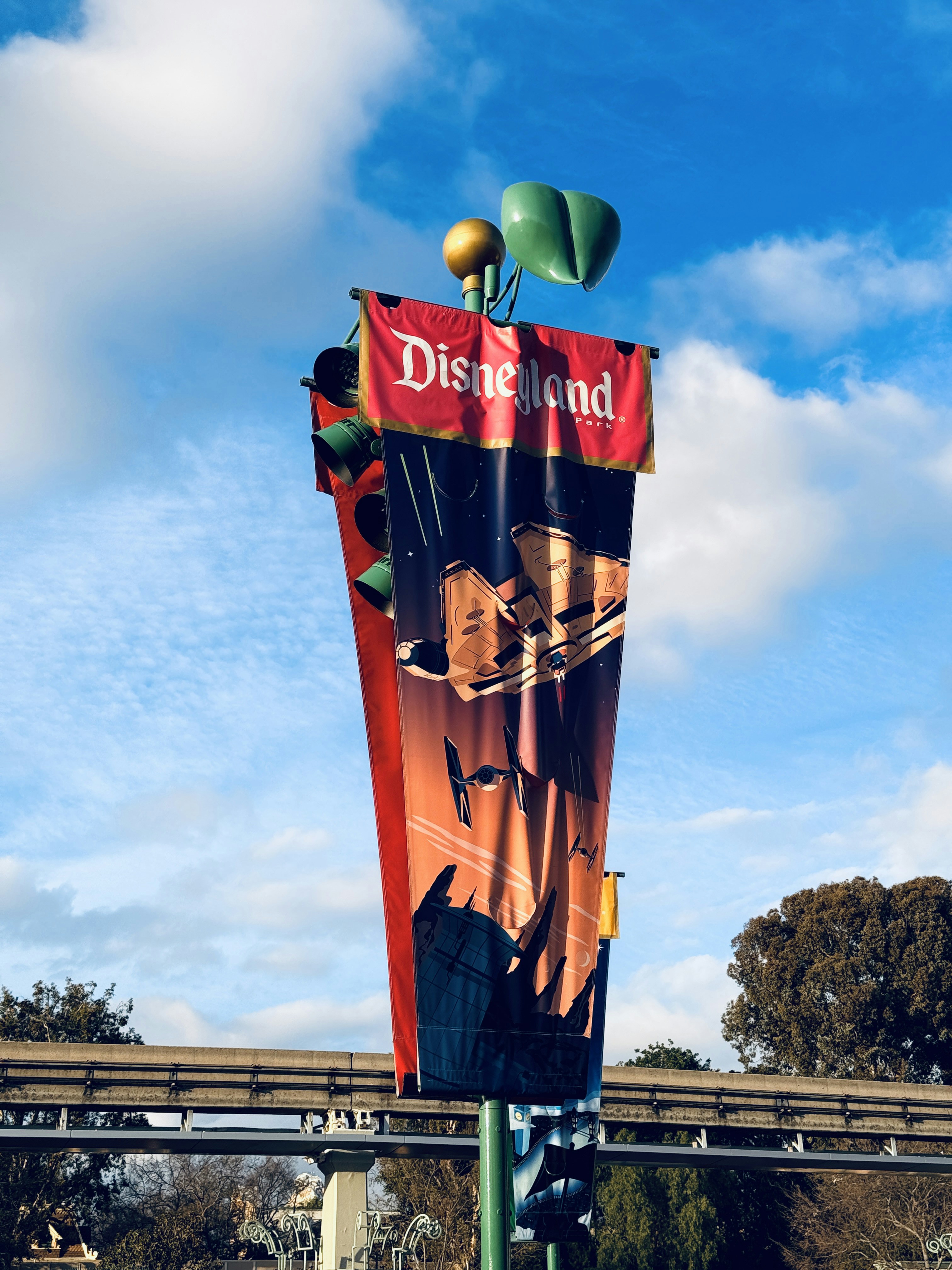 Towering Disneyland Banner Against a Crisp Blue Sky