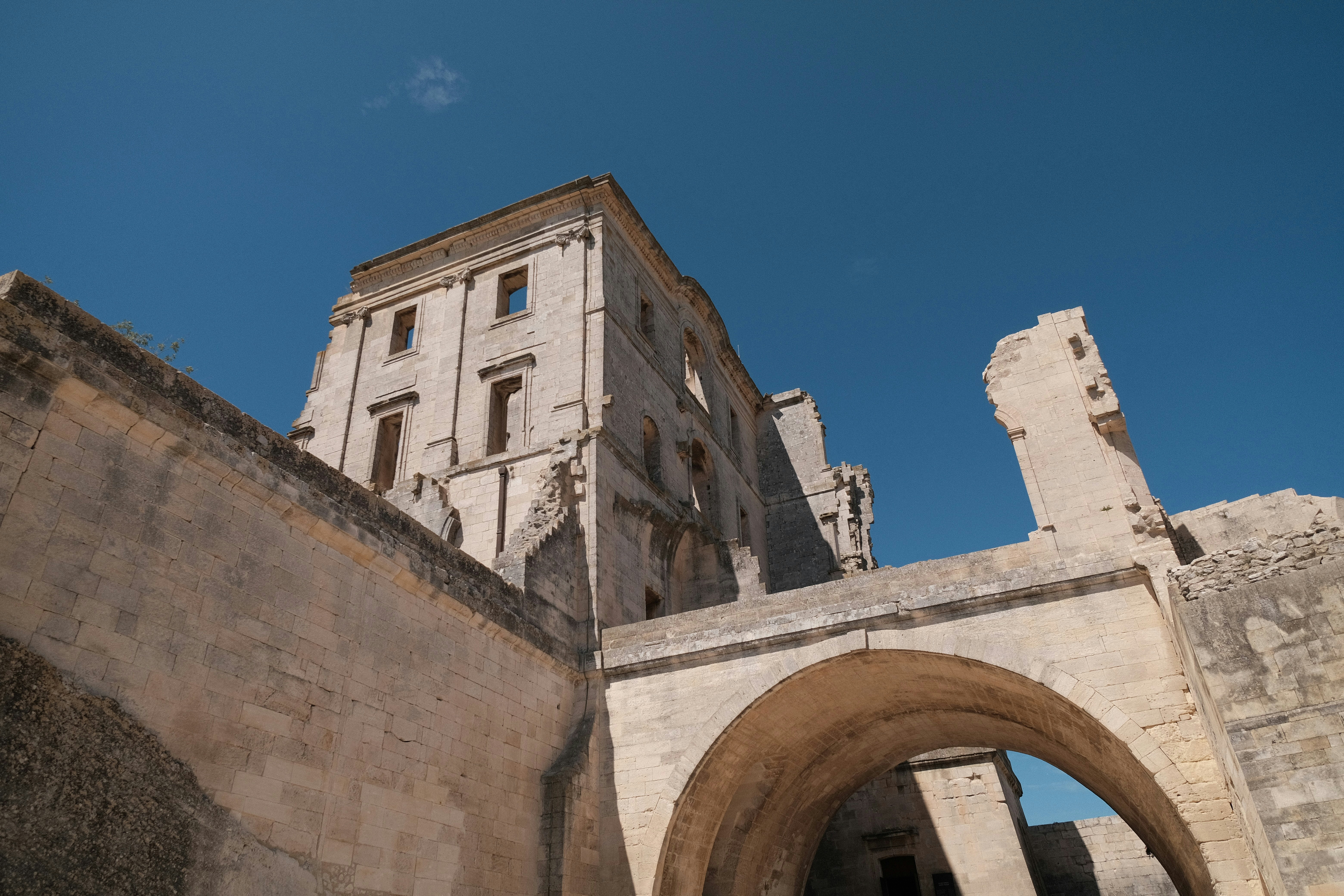 A very old building with a very tall tower photo – Free Building Image ...