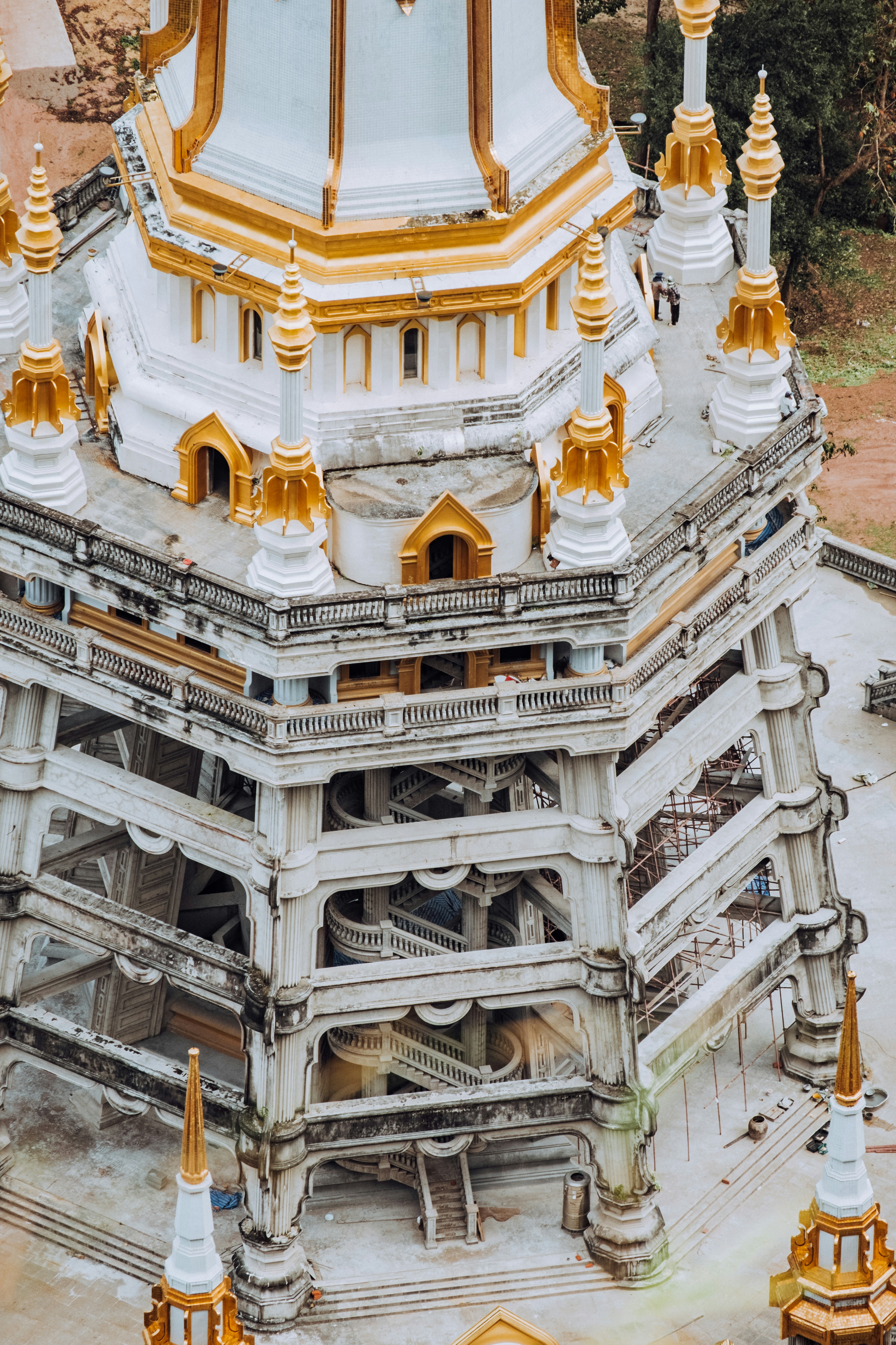 A large white and gold building with many spires photo – Free ...