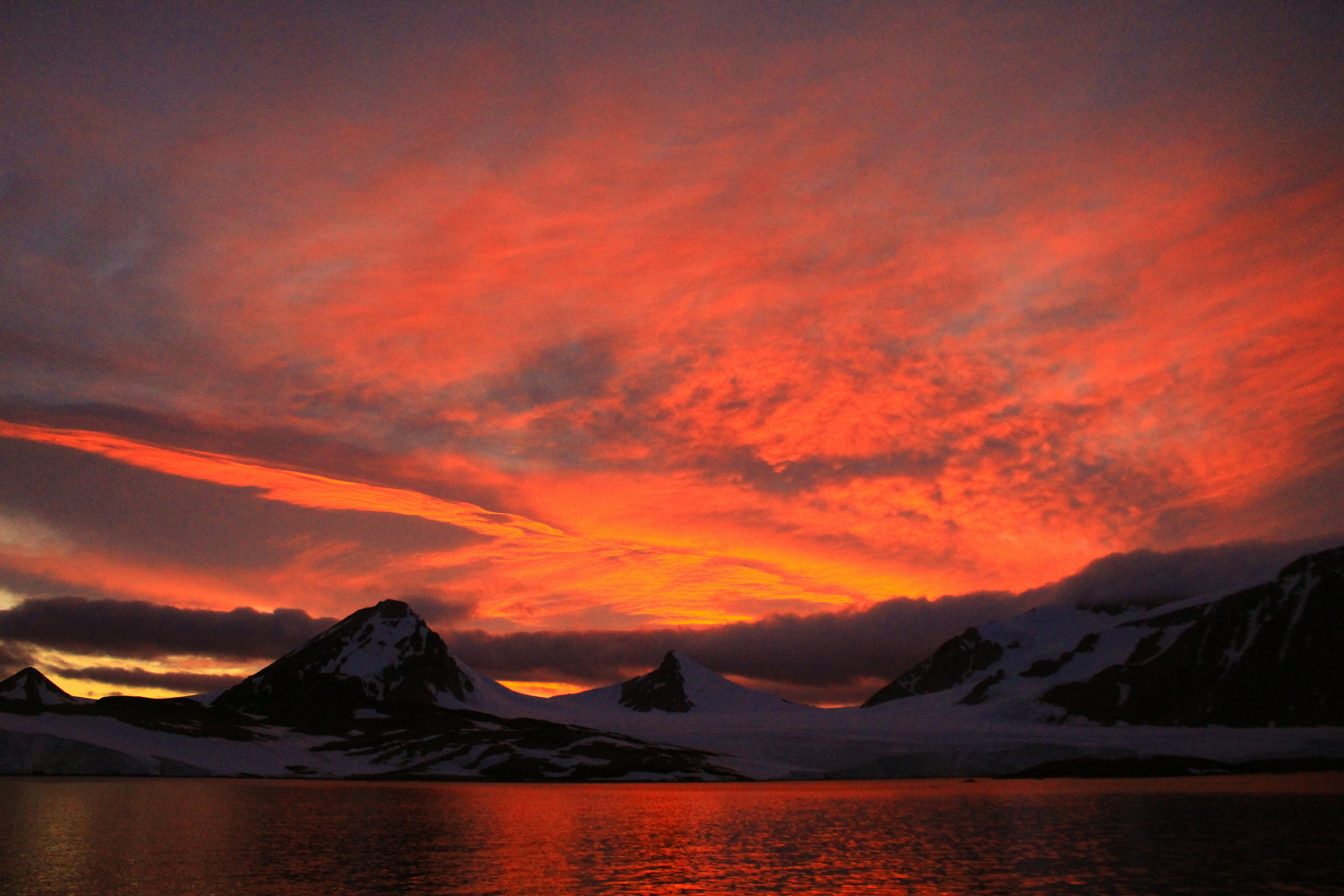Fiery Twilight Over Arctic Peaks