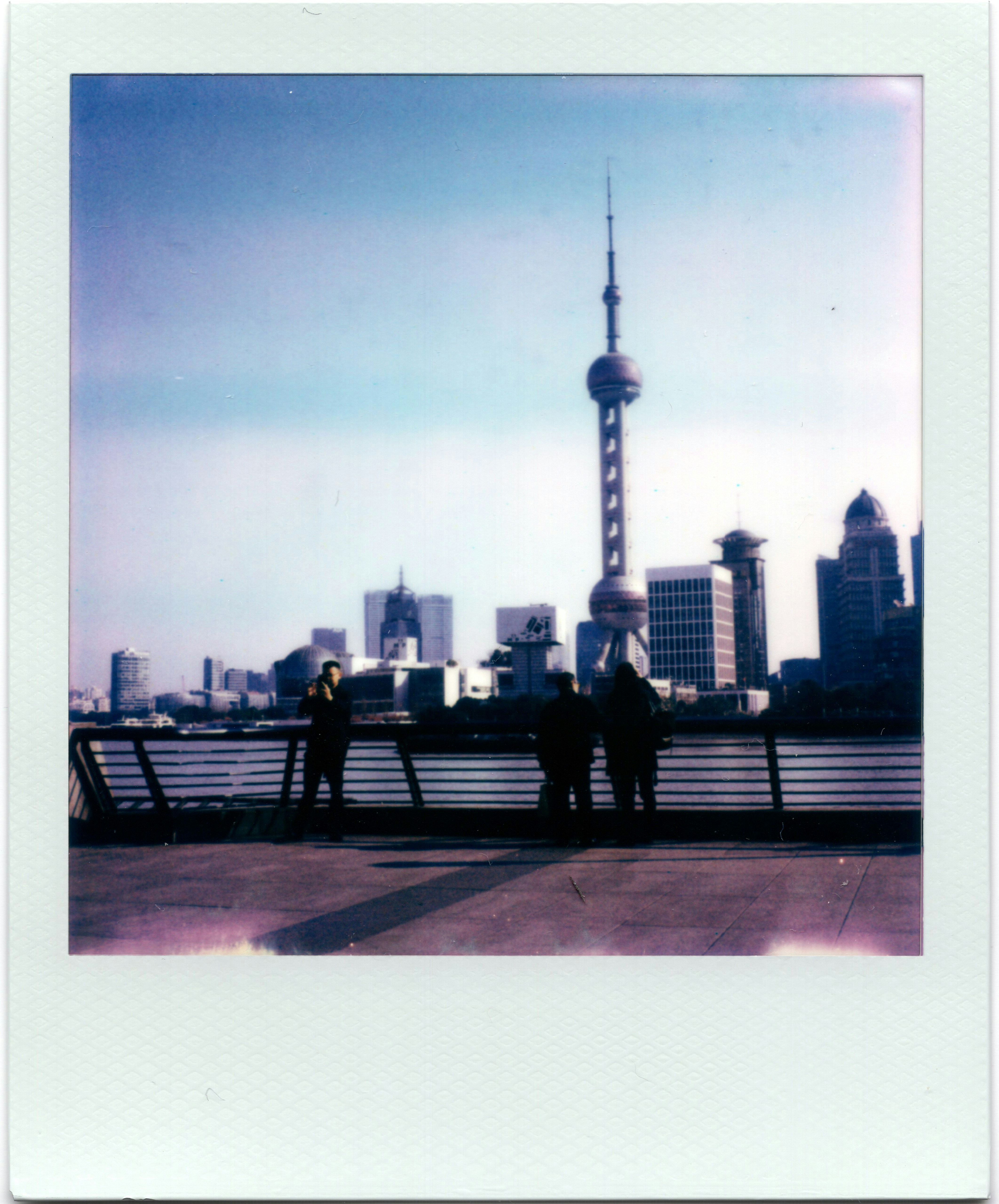 Bund Horizon: The Oriental Tower Rising Over a Quiet Blue Shanghai