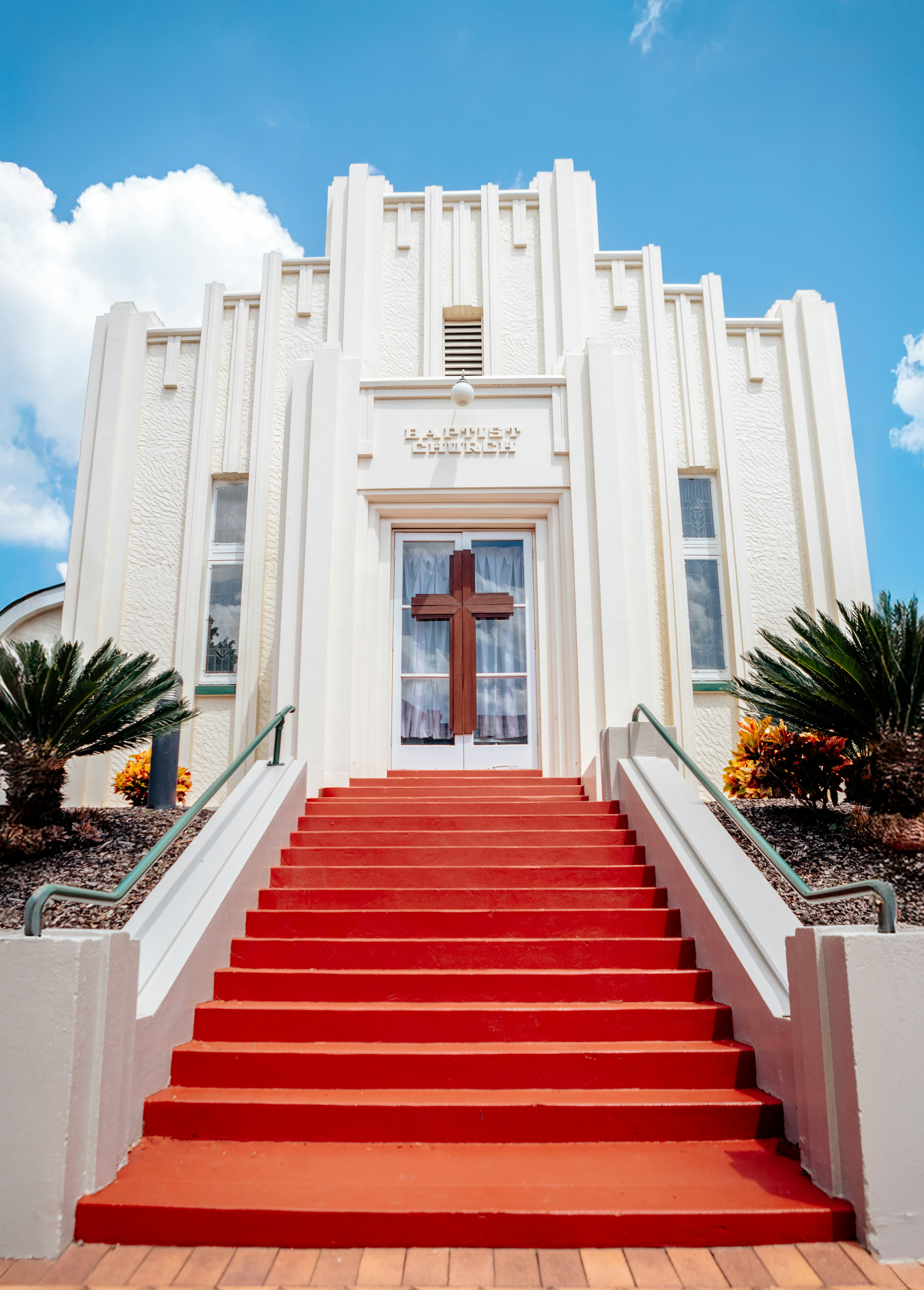 Ascension at the White Chapel: Bold Red Steps to a Cross