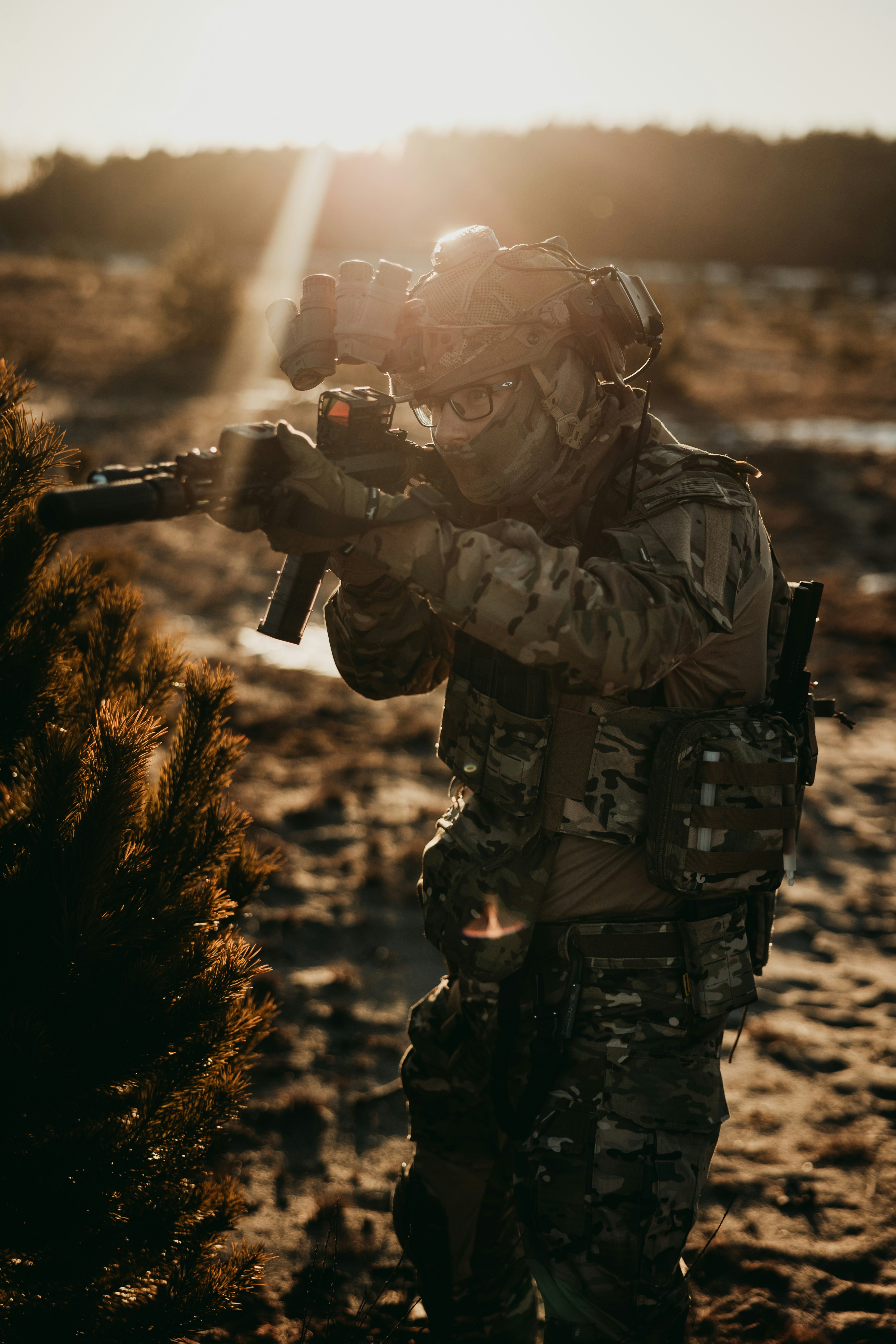 Airsoft player wearing 8Fields Tactical gear and using Well Pro WE07 during the game