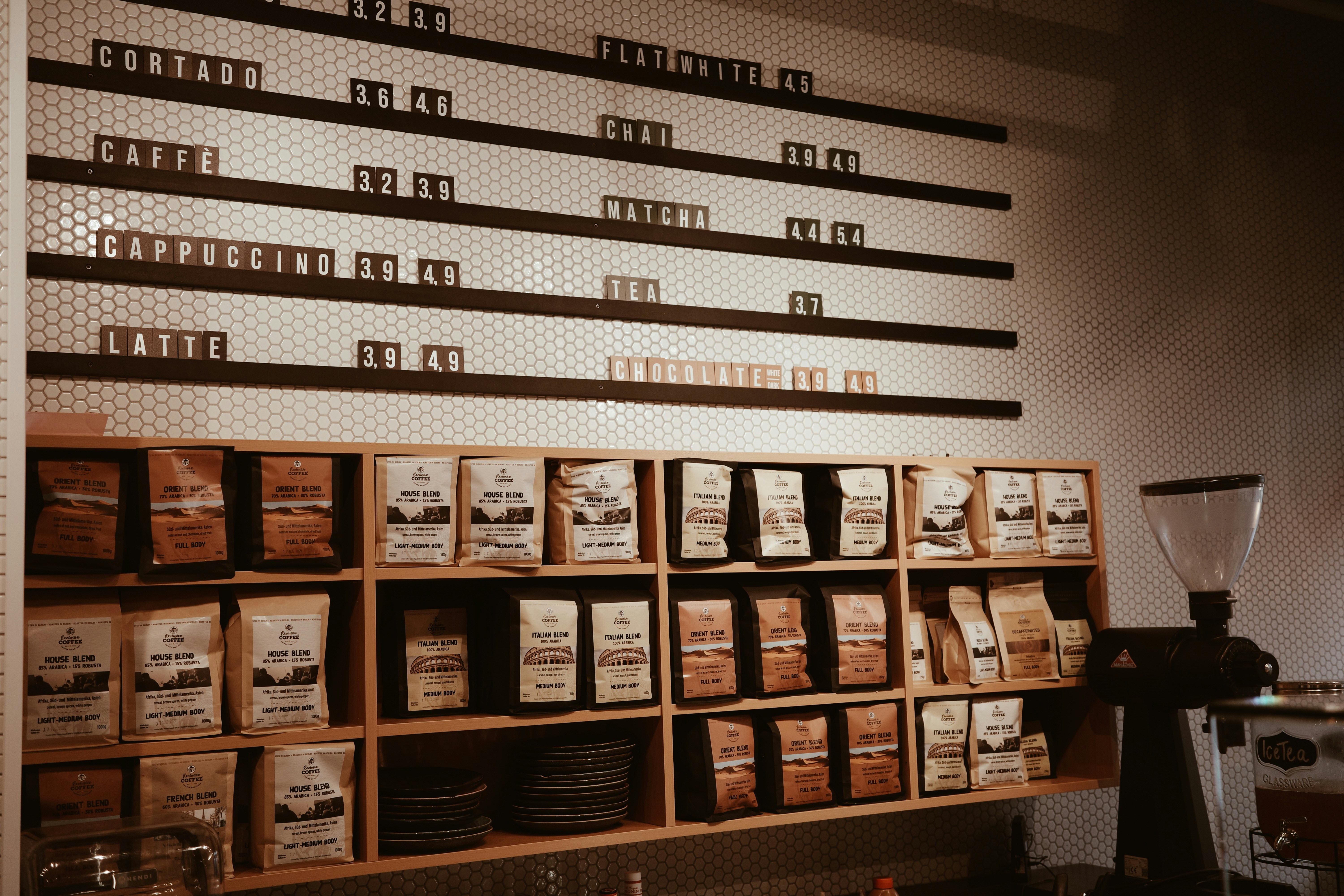 A coffee shop filled with lots of coffee photo – Free Coffee Image on ...