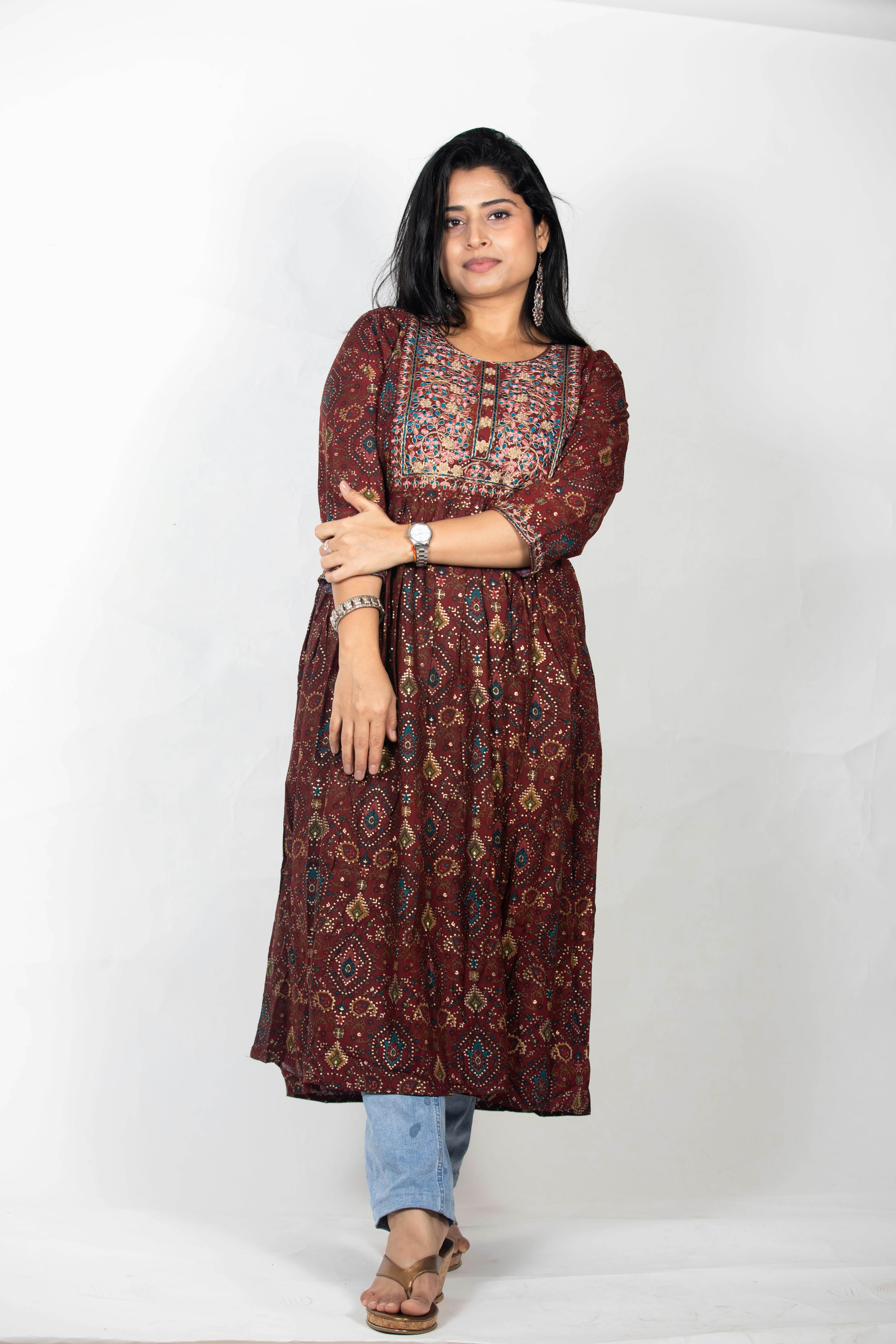 Woman models a printed ethnic dress and jeans. photo – Free Woman Image ...