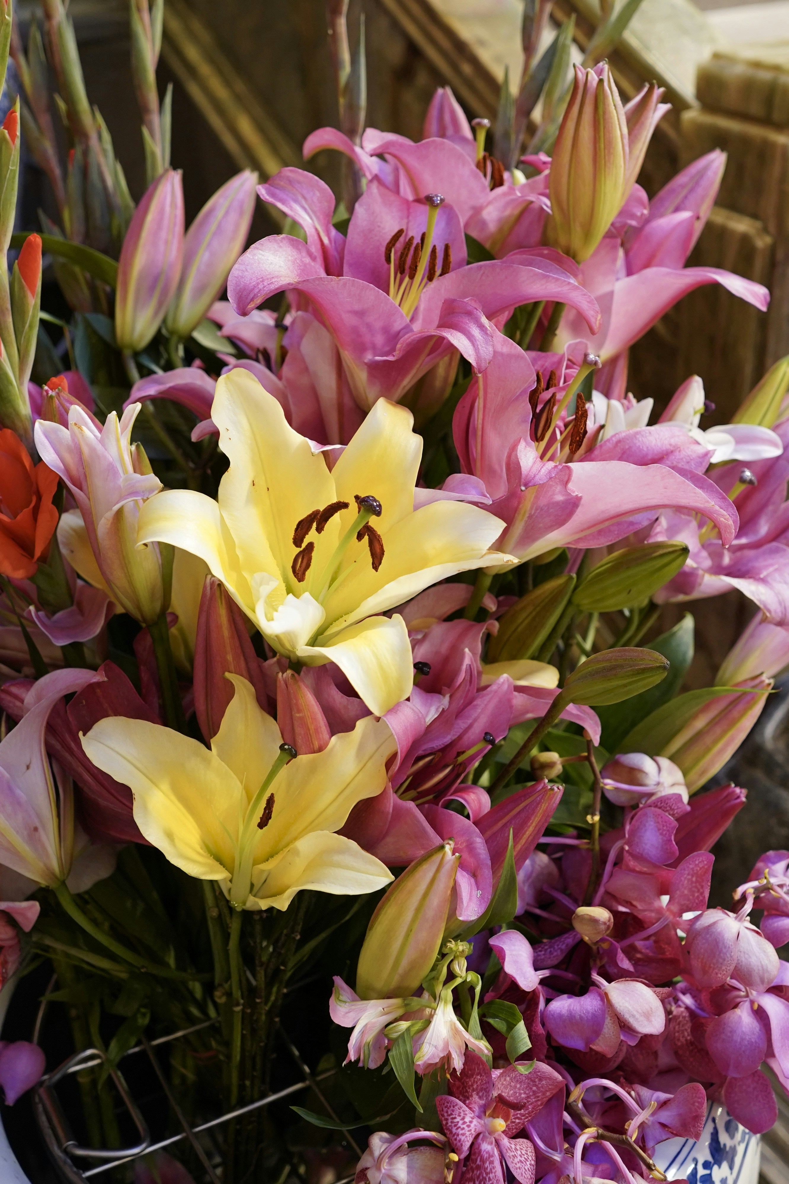 A vibrant bouquet of pink and yellow lilies. photo – Free Flowers Image ...
