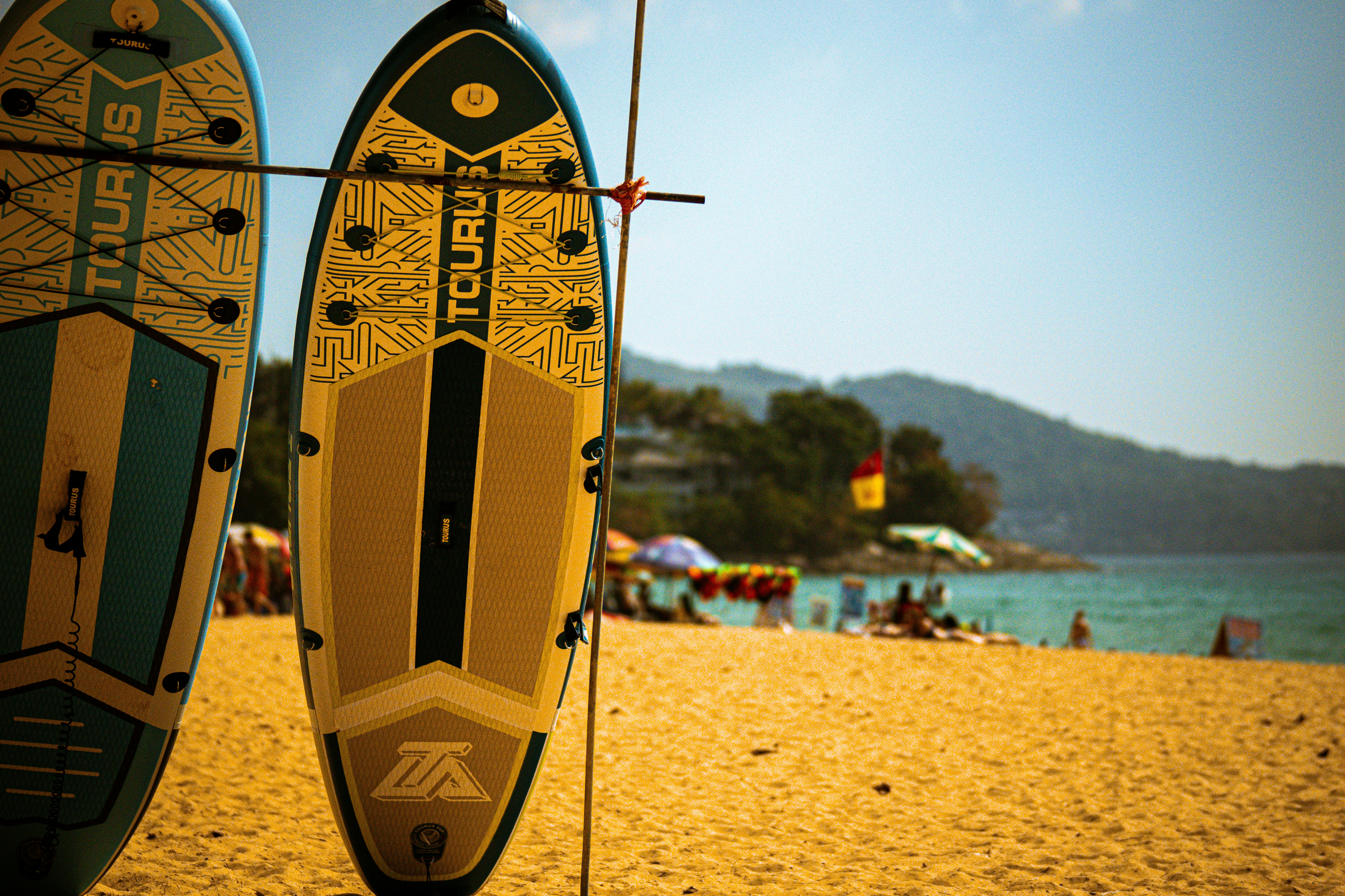 Sunlit Serenity: Paddleboards on a Golden Shore