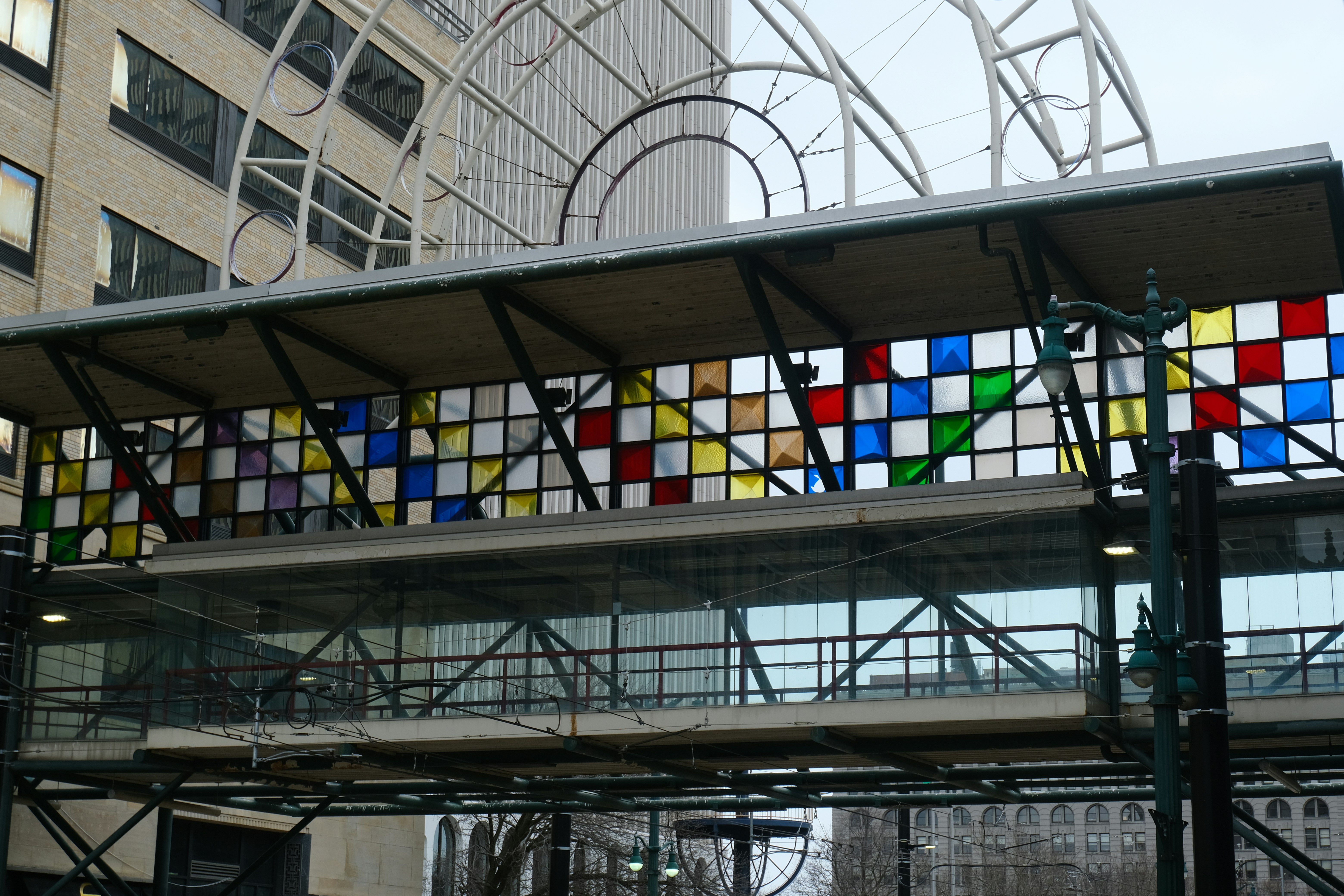 A colorful pedestrian bridge connects buildings. photo – Free Buffalo ...