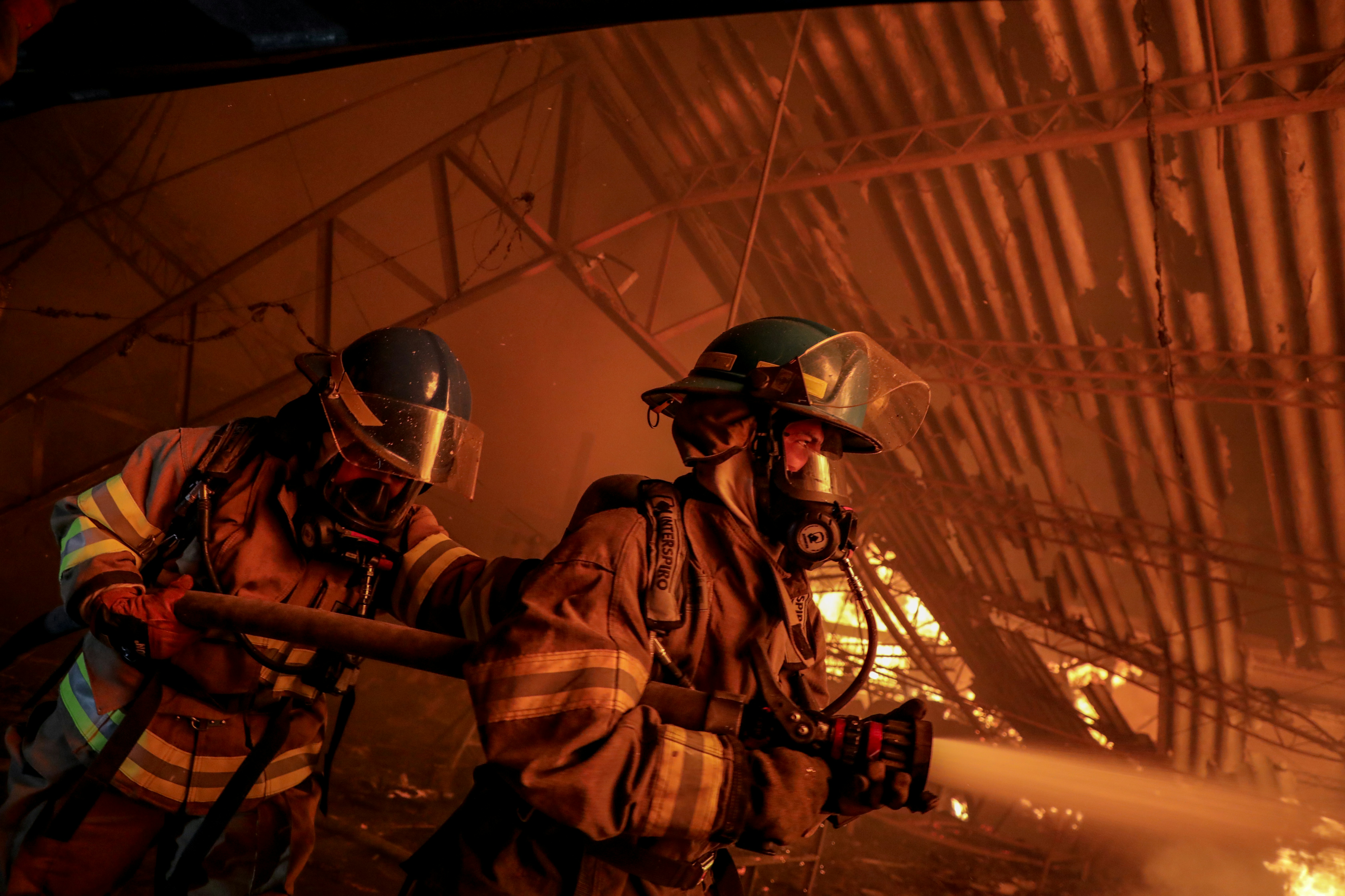 Firefighters are battling a blaze inside a structure. photo – Free Fire ...