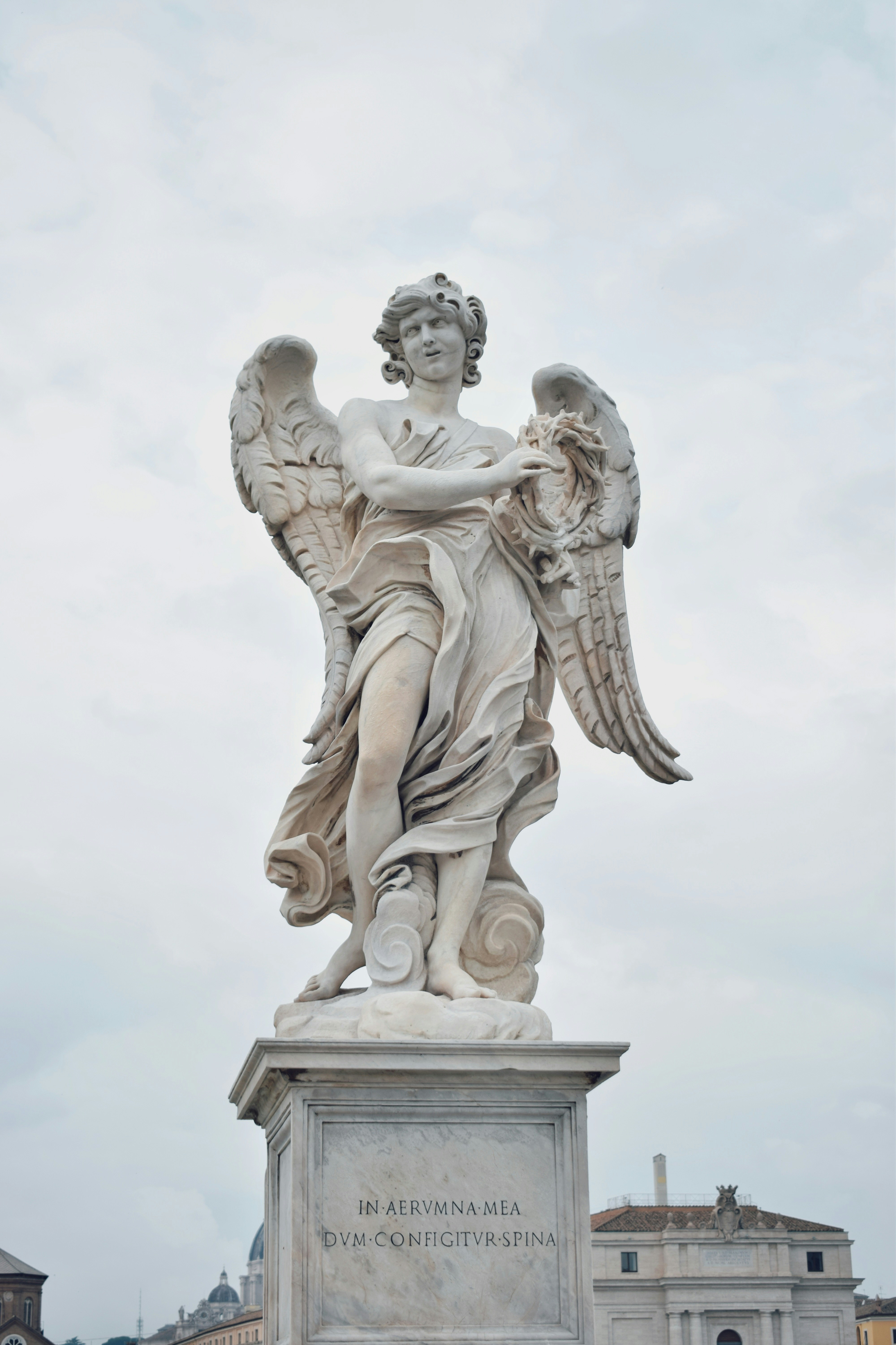 A statue of an angel with outstretched wings. photo – Free Woman Image ...