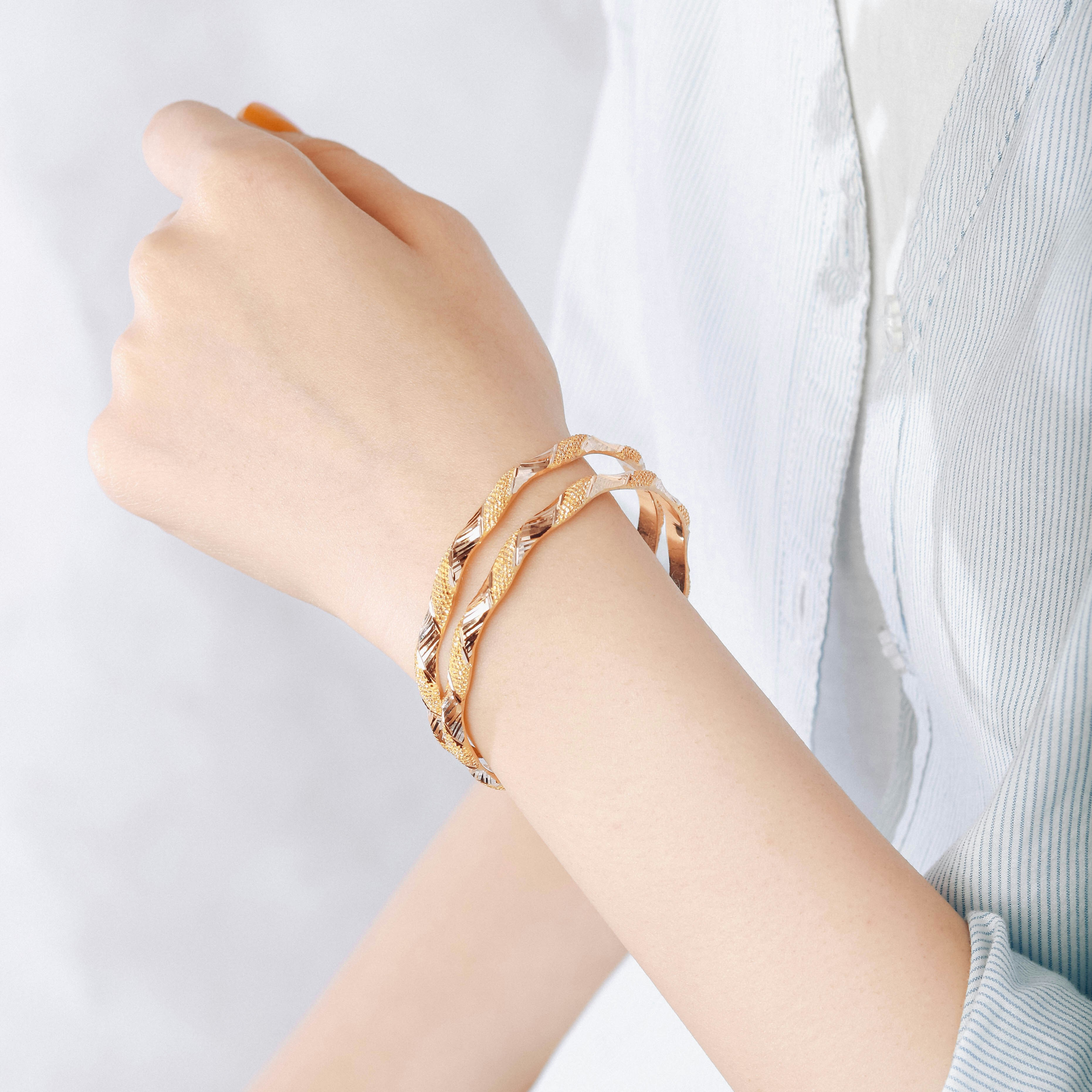 Heavy gold bangle suitable for young girls