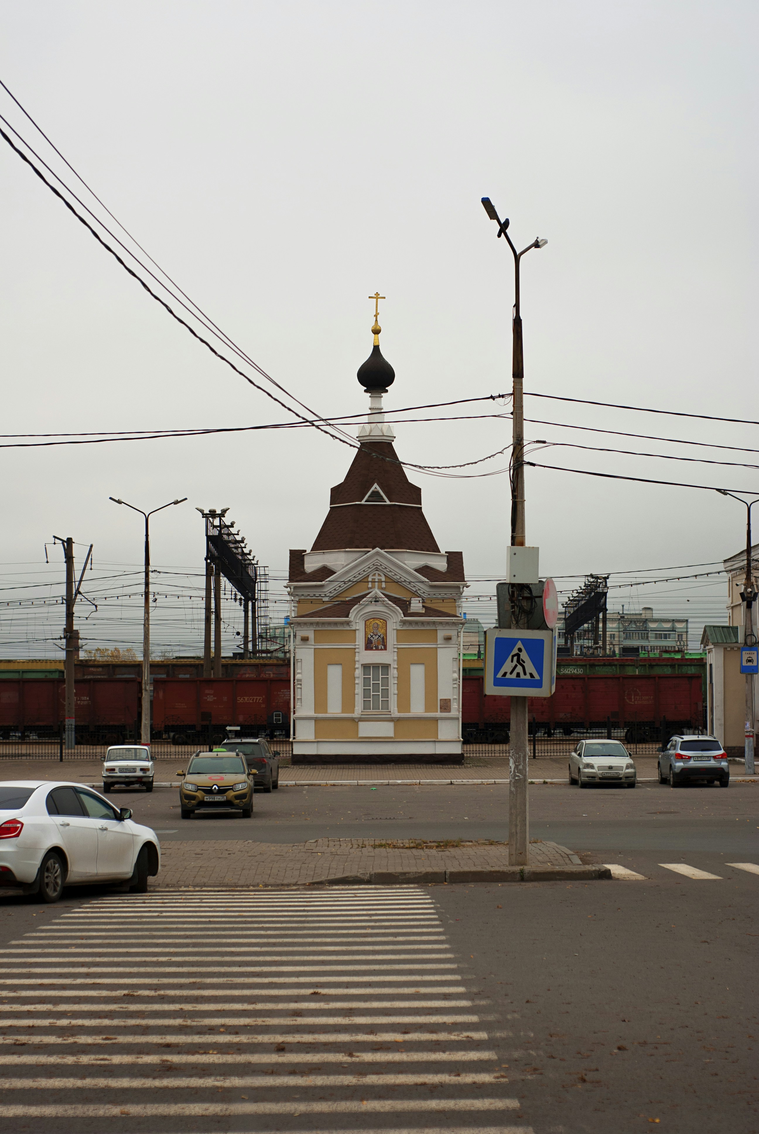 Crossroads Chapel: A pale-yellow beacon amid a web of power lines