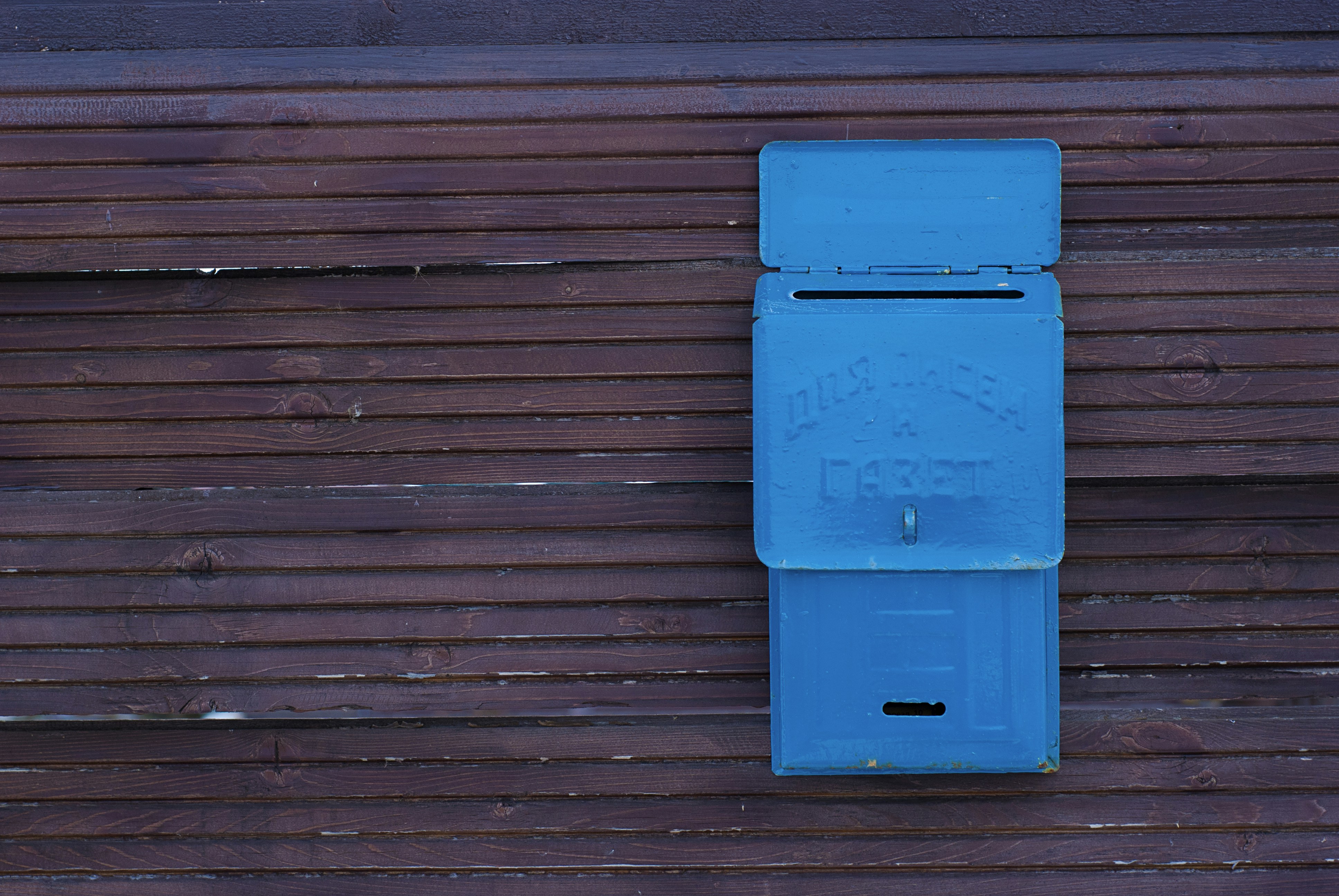 Rustic Blues: A Quiet Corner Postbox