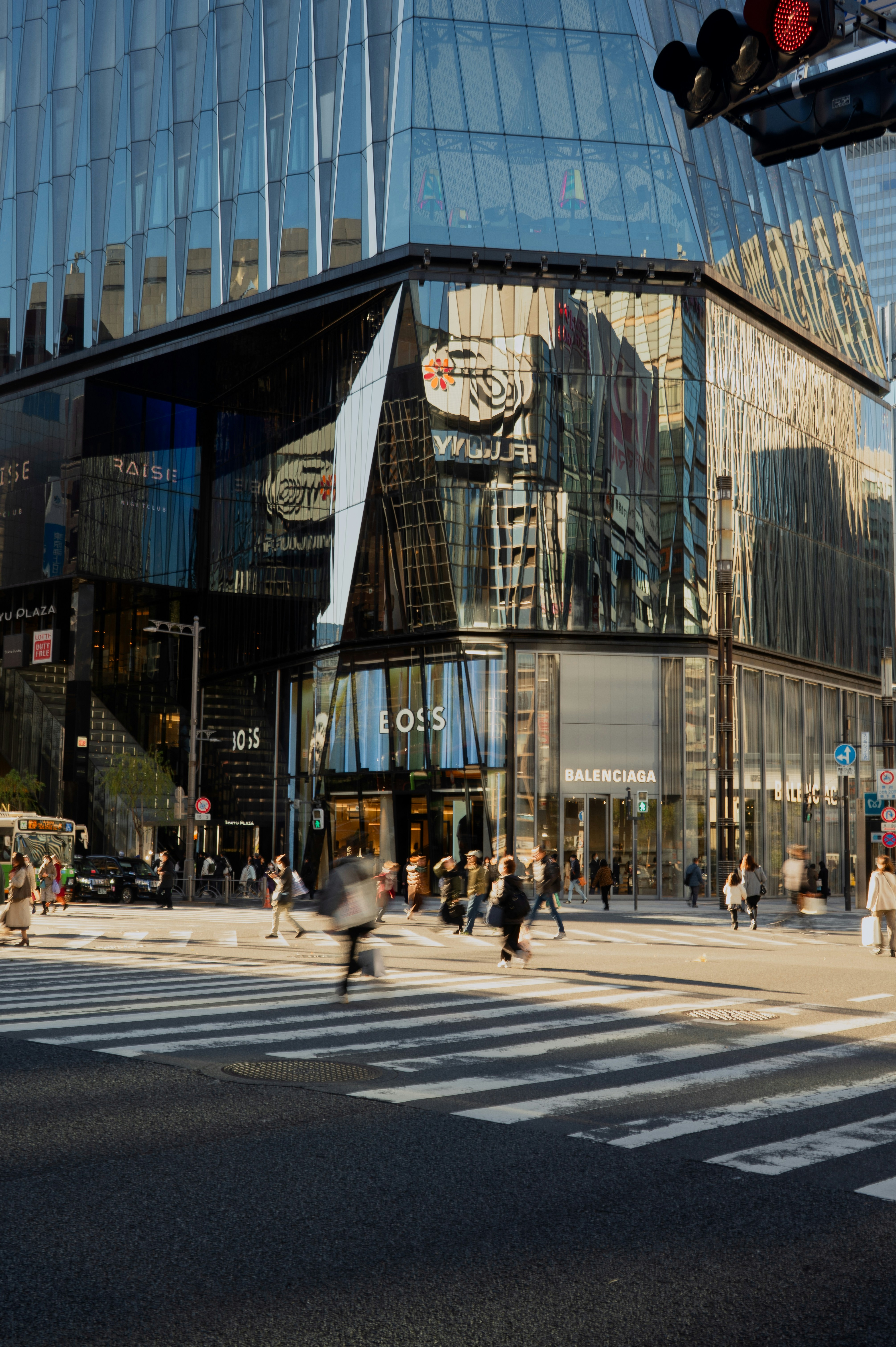 A modern building with boss and balenciaga stores. photo – Free ...