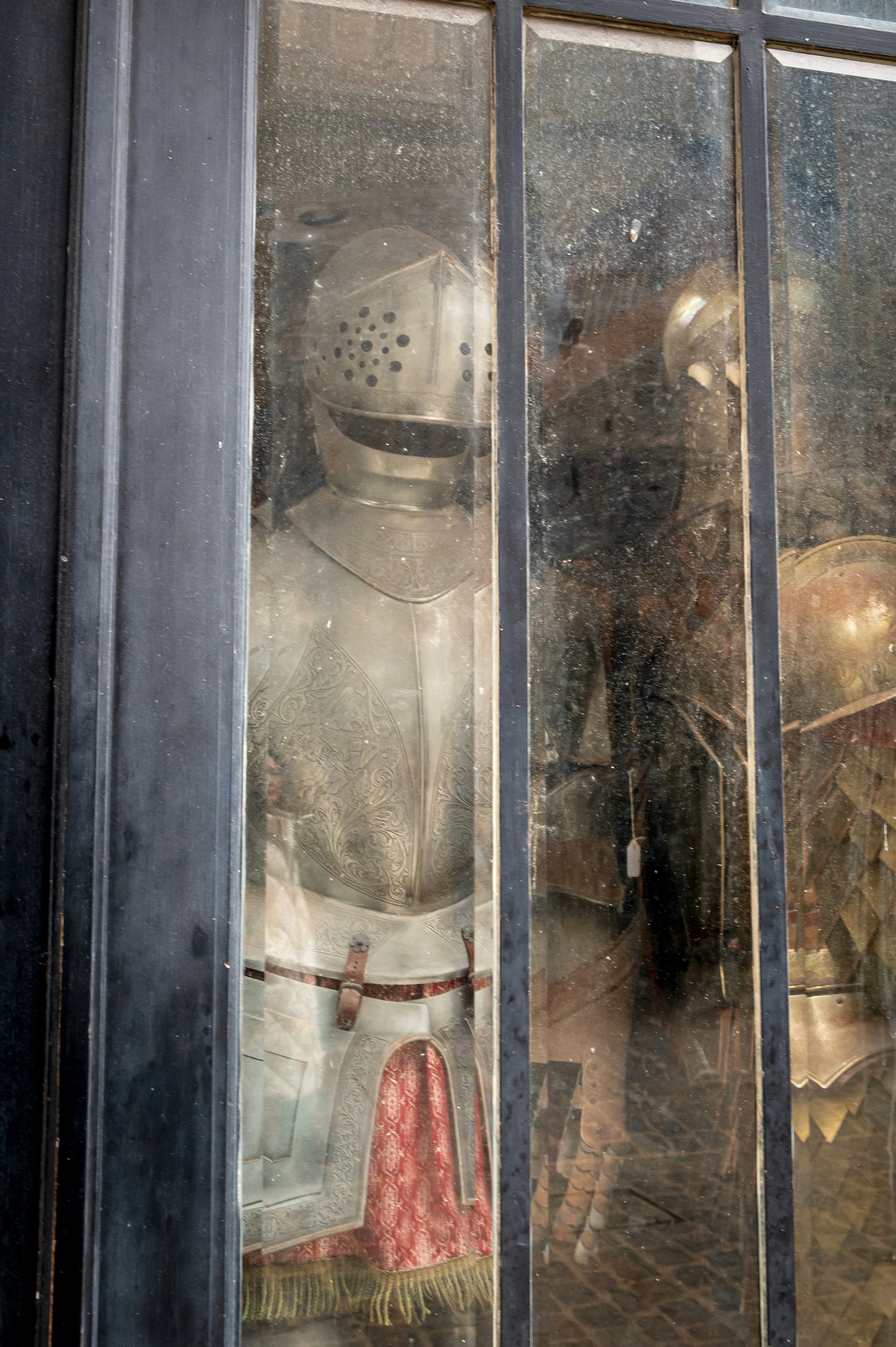 Armored Silence Behind Painted Glass