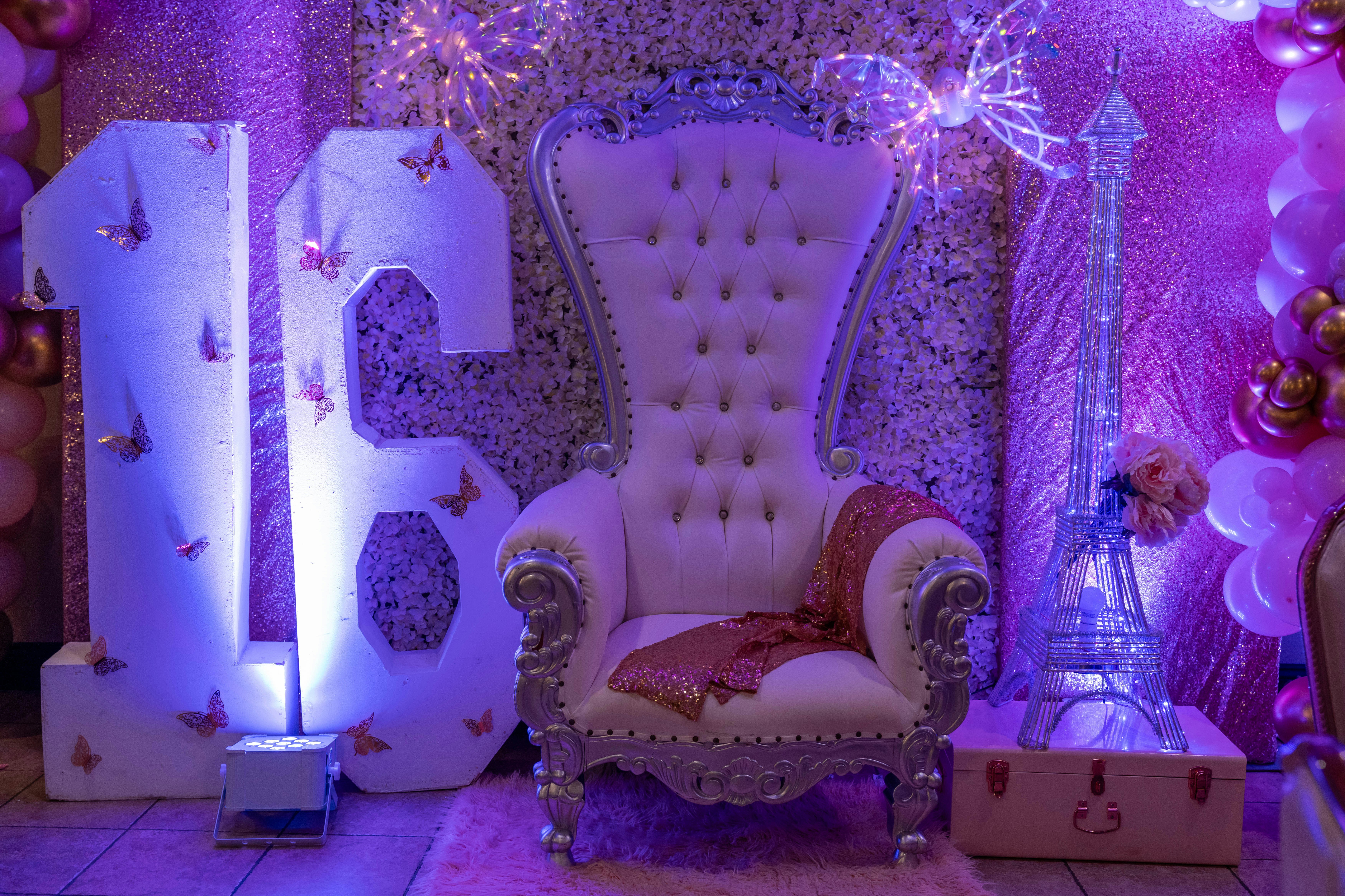 The Velvet Throne Beneath Neon Lilac for a 16th Birthday Night