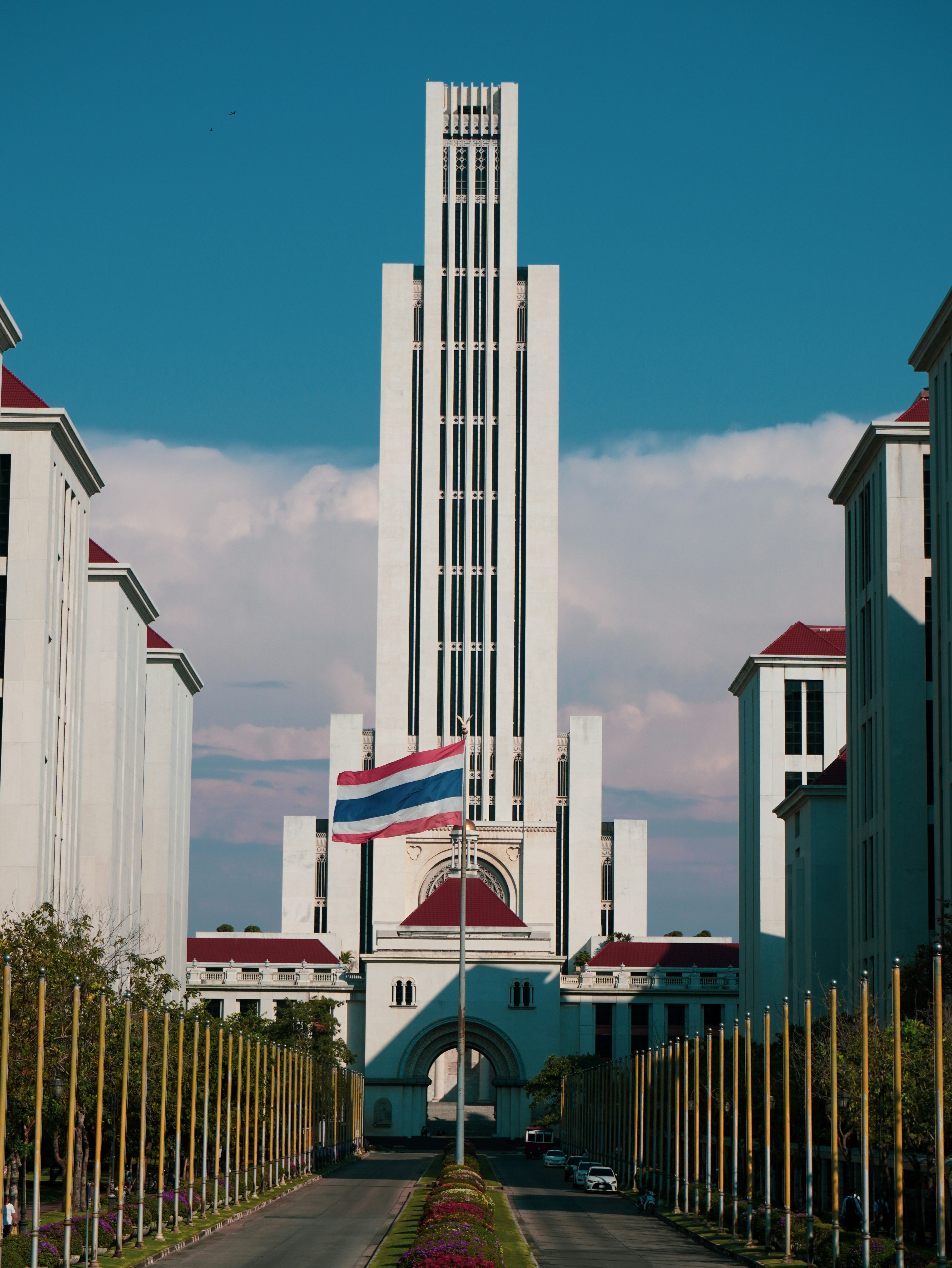 Skyward Spine: Flag-Framed Boulevard Toward a Central Tower