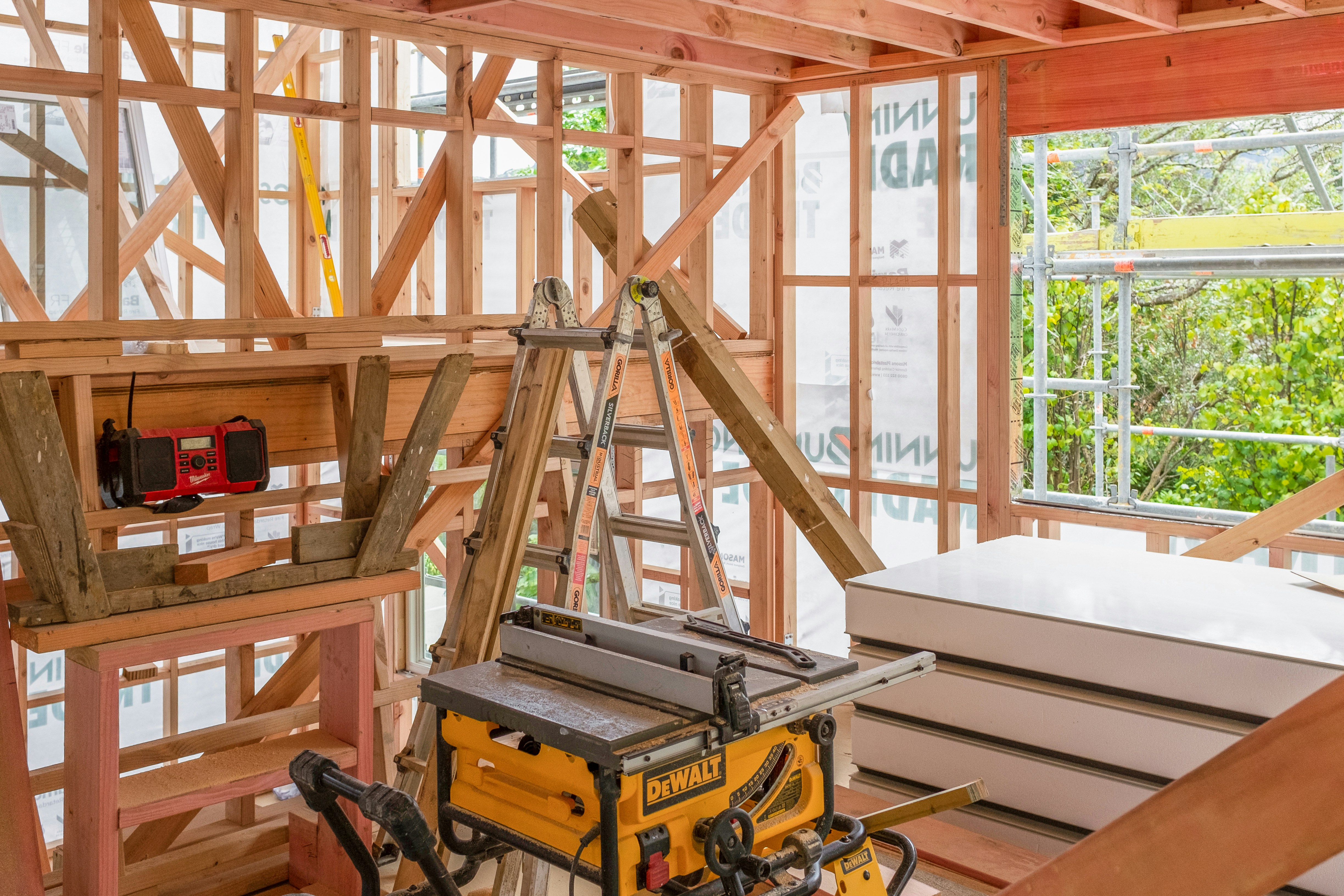 Construction site showing wood framework and tools. photo – Free New ...