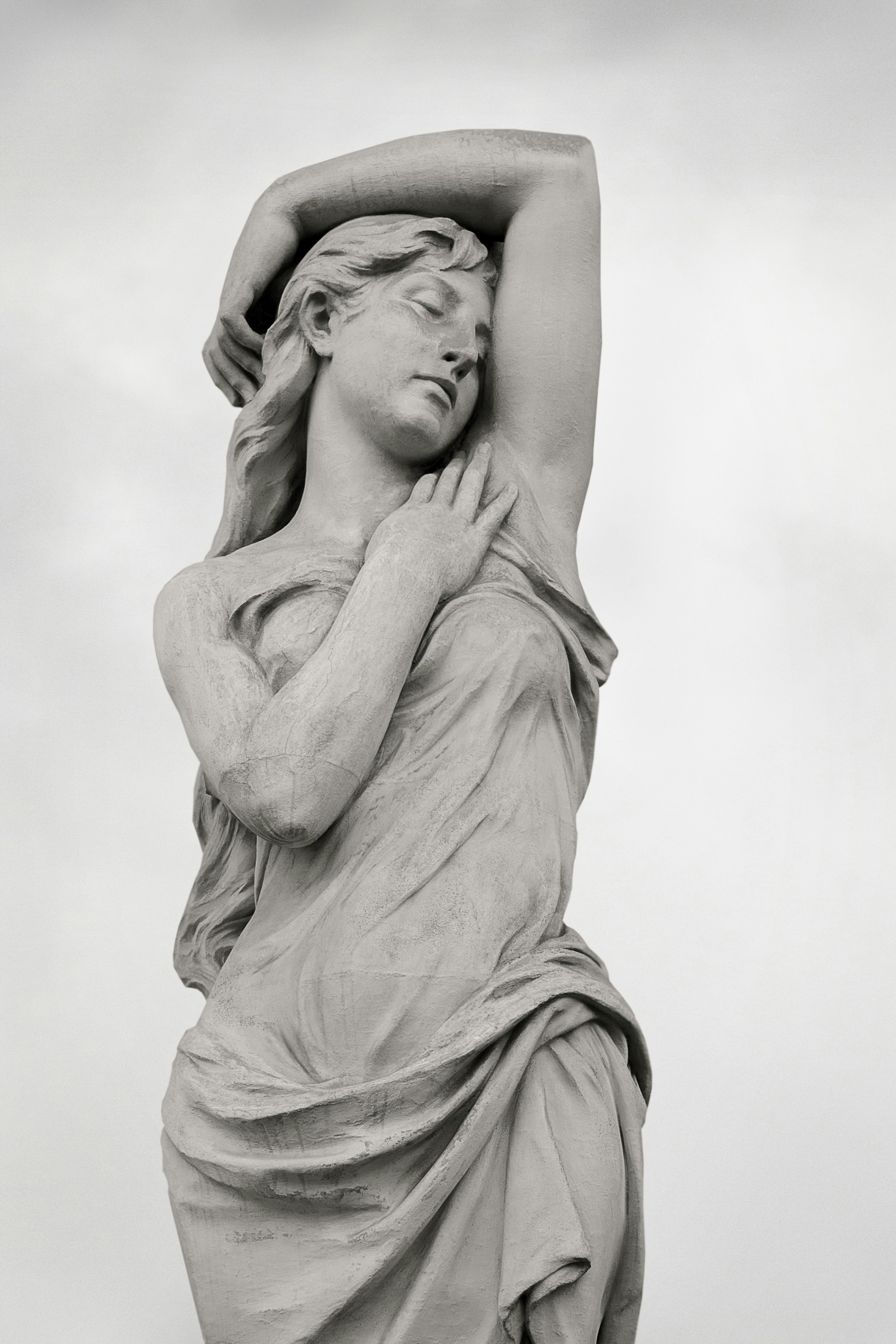 A beautiful statue of a woman in repose. photo – Free Photo Image on ...