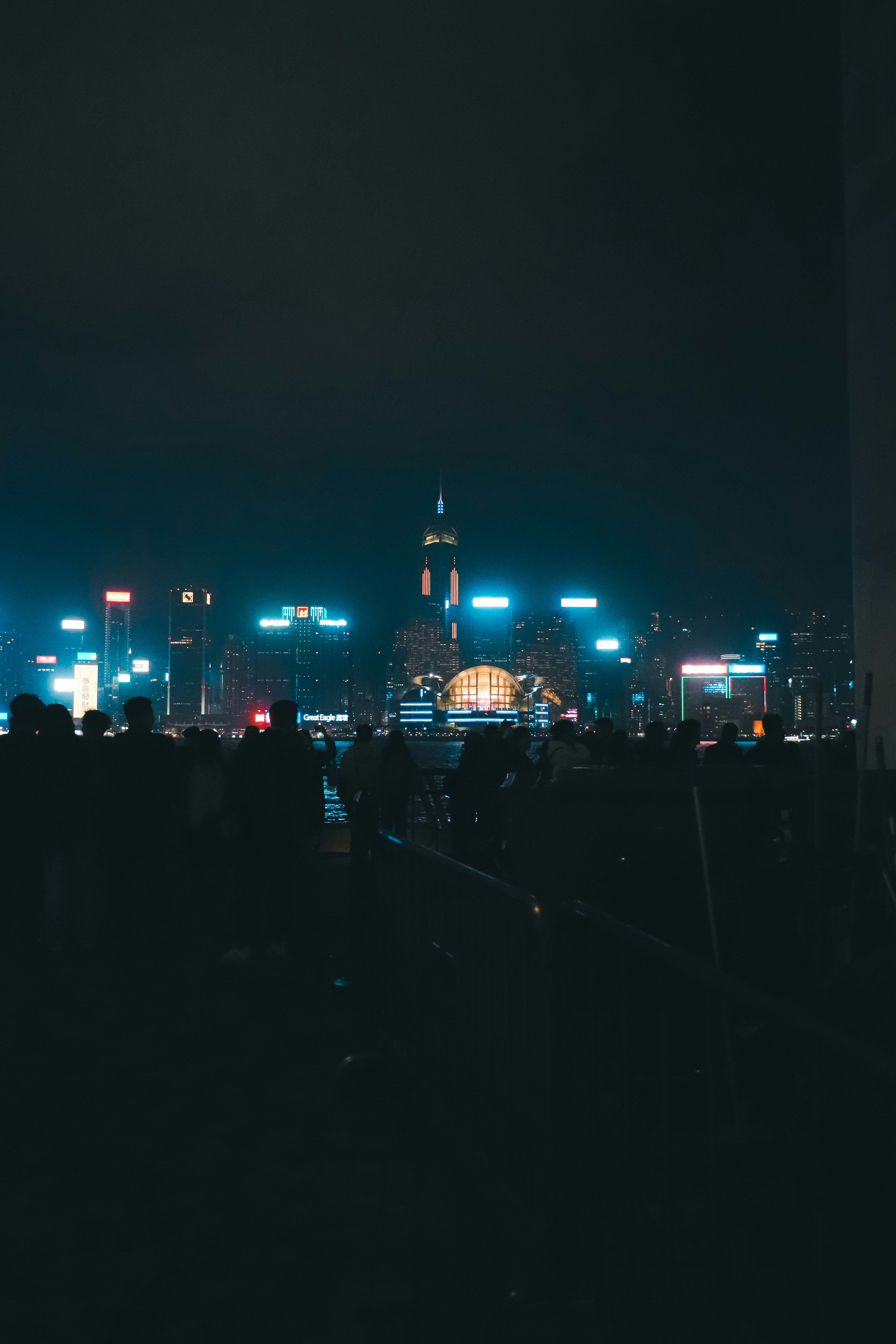 Nighttime skyline view with people in silhouette. photo – Free City ...