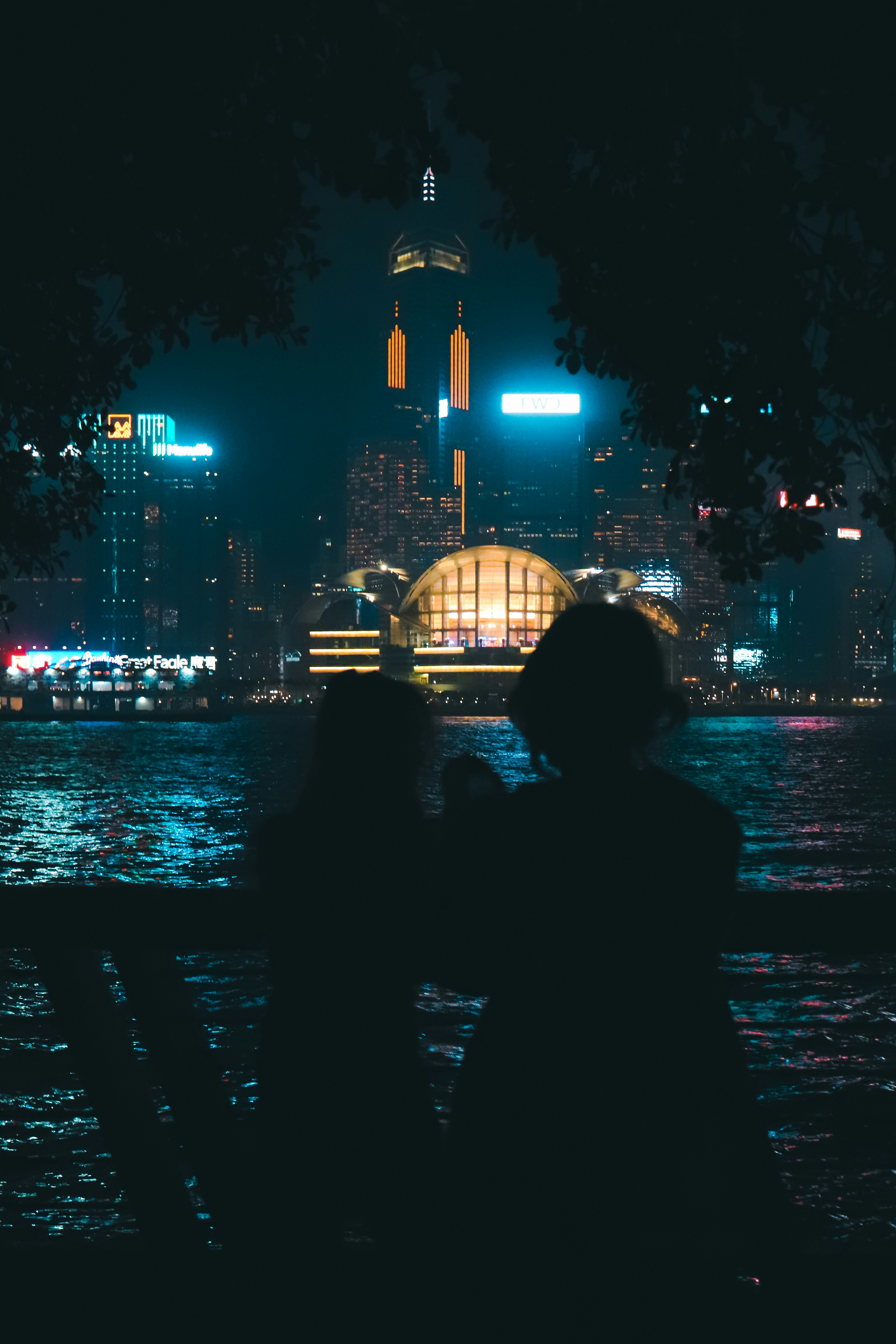 Two people admire the city skyline at night. photo – Free Street ...