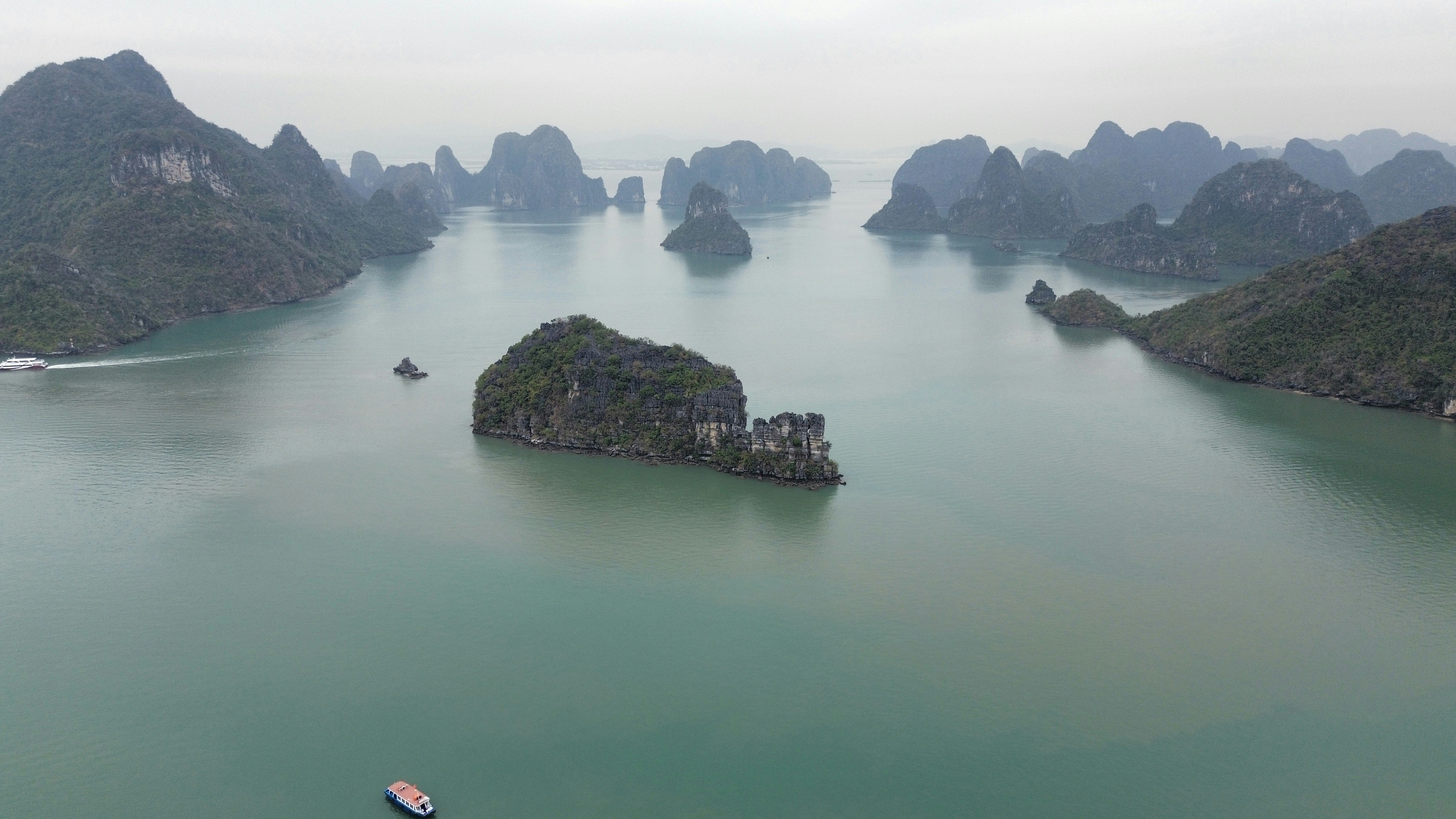 Emerald Serenity Among Limestone Giants