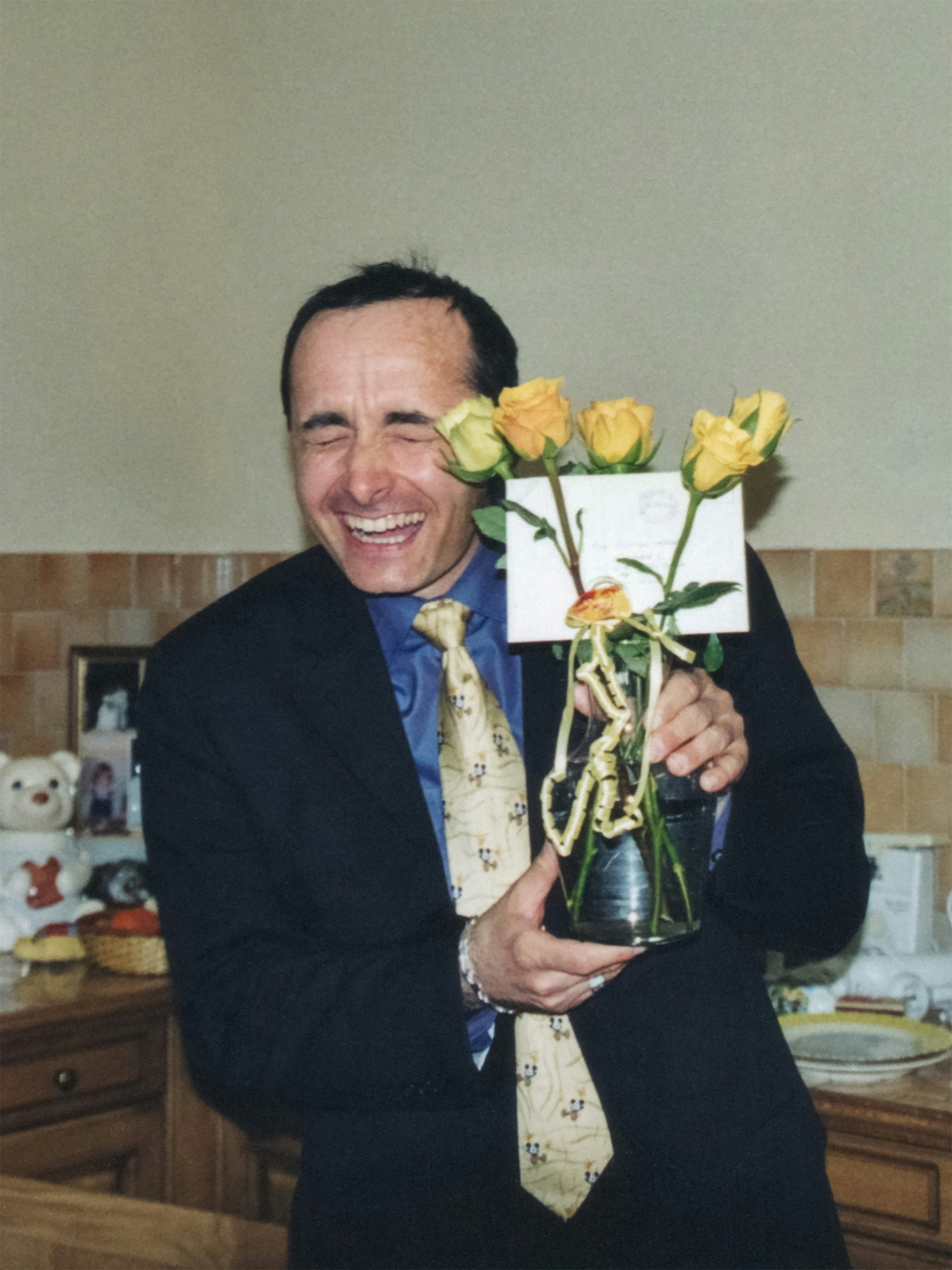 Man happily shows off a bouquet of yellow roses. photo – Free Flower ...