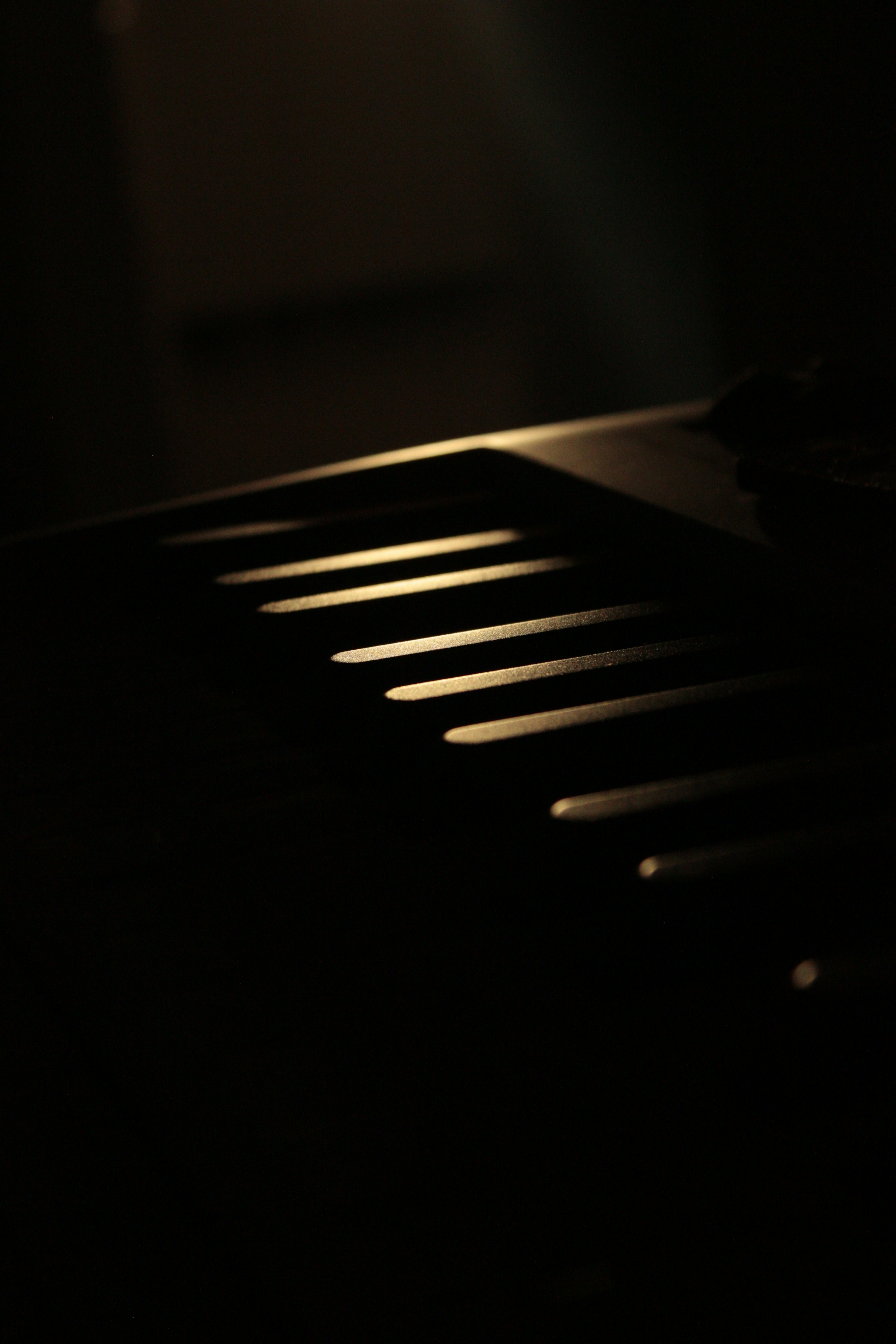 Keyboard keys in a dark and warm lighting. photo – Free Piano Image on ...