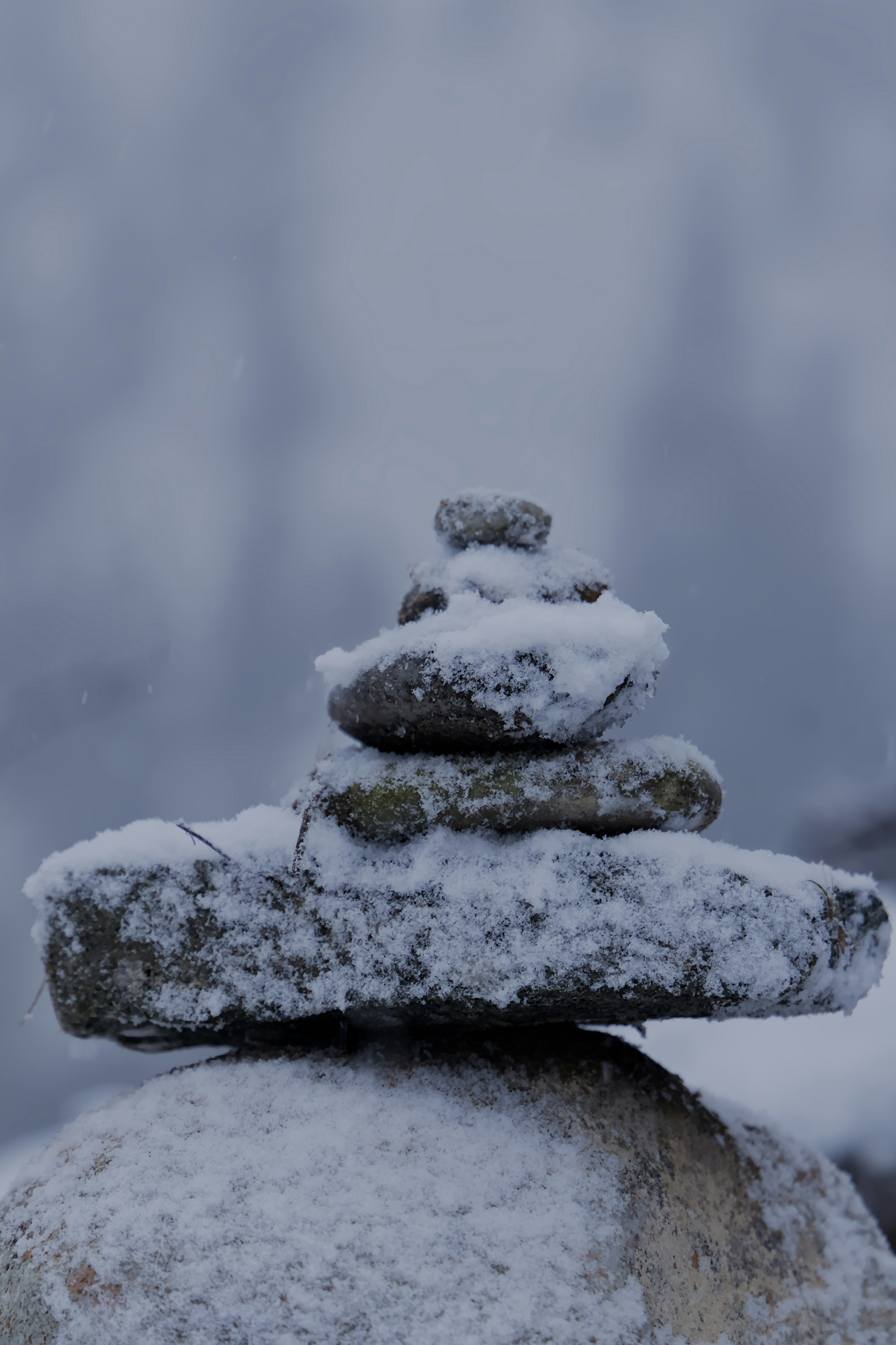 Snowbound Cairn: A Quiet Stack of Stones in Winter Silence