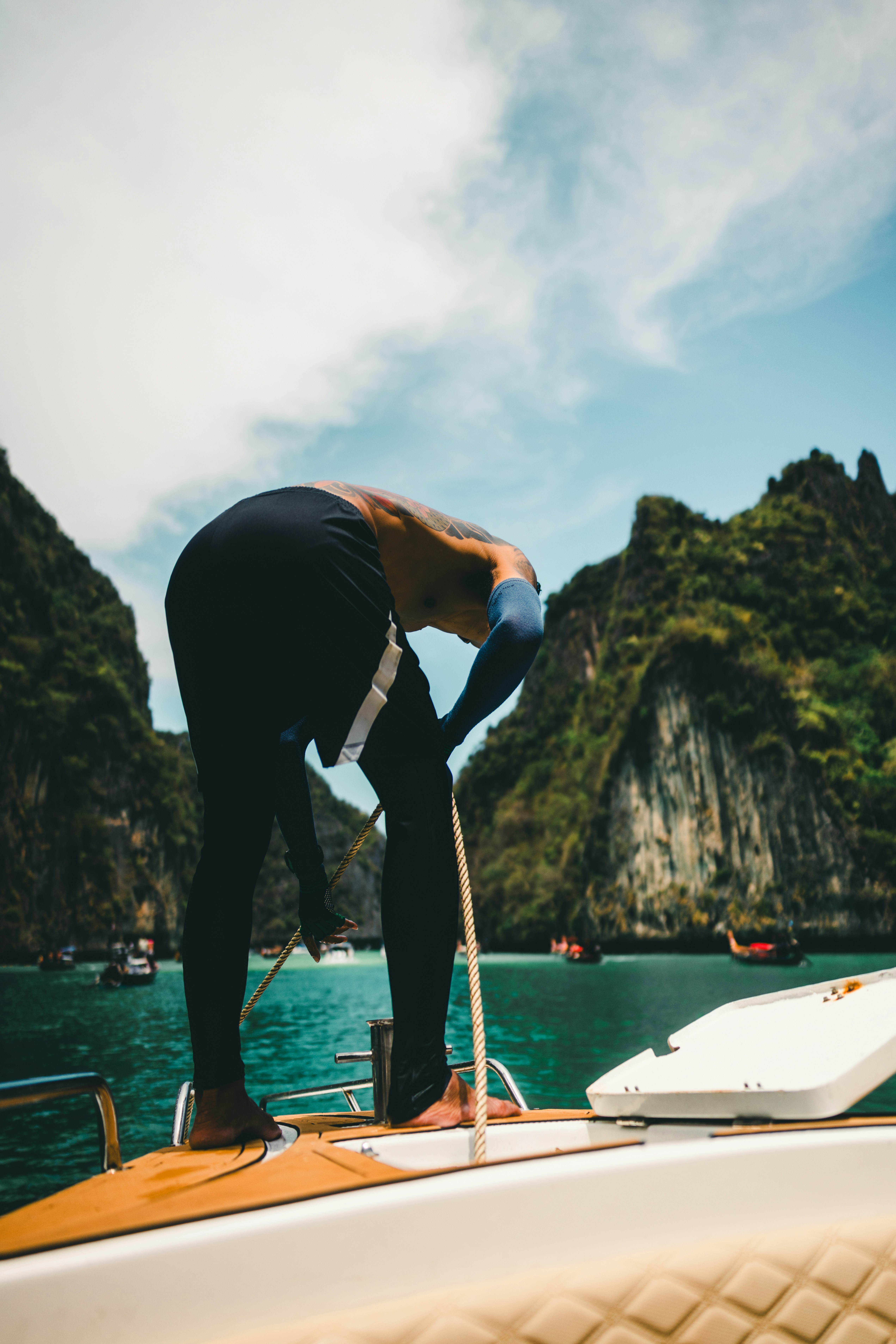 Leaning Climber at Sea-Kissed Cliffs