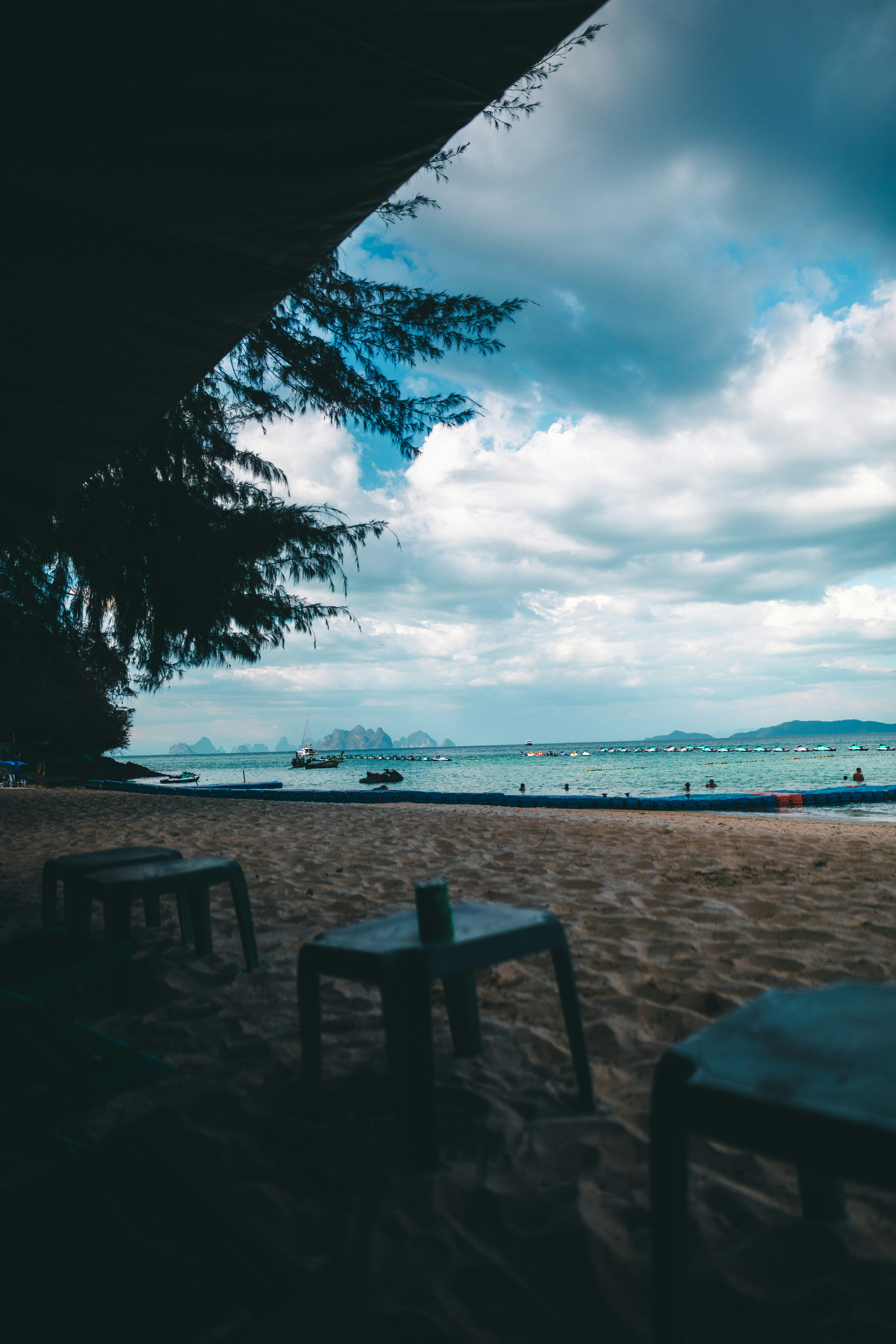 Beach scene under a cloudy, dramatic sky. photo – Free Forest Image on ...