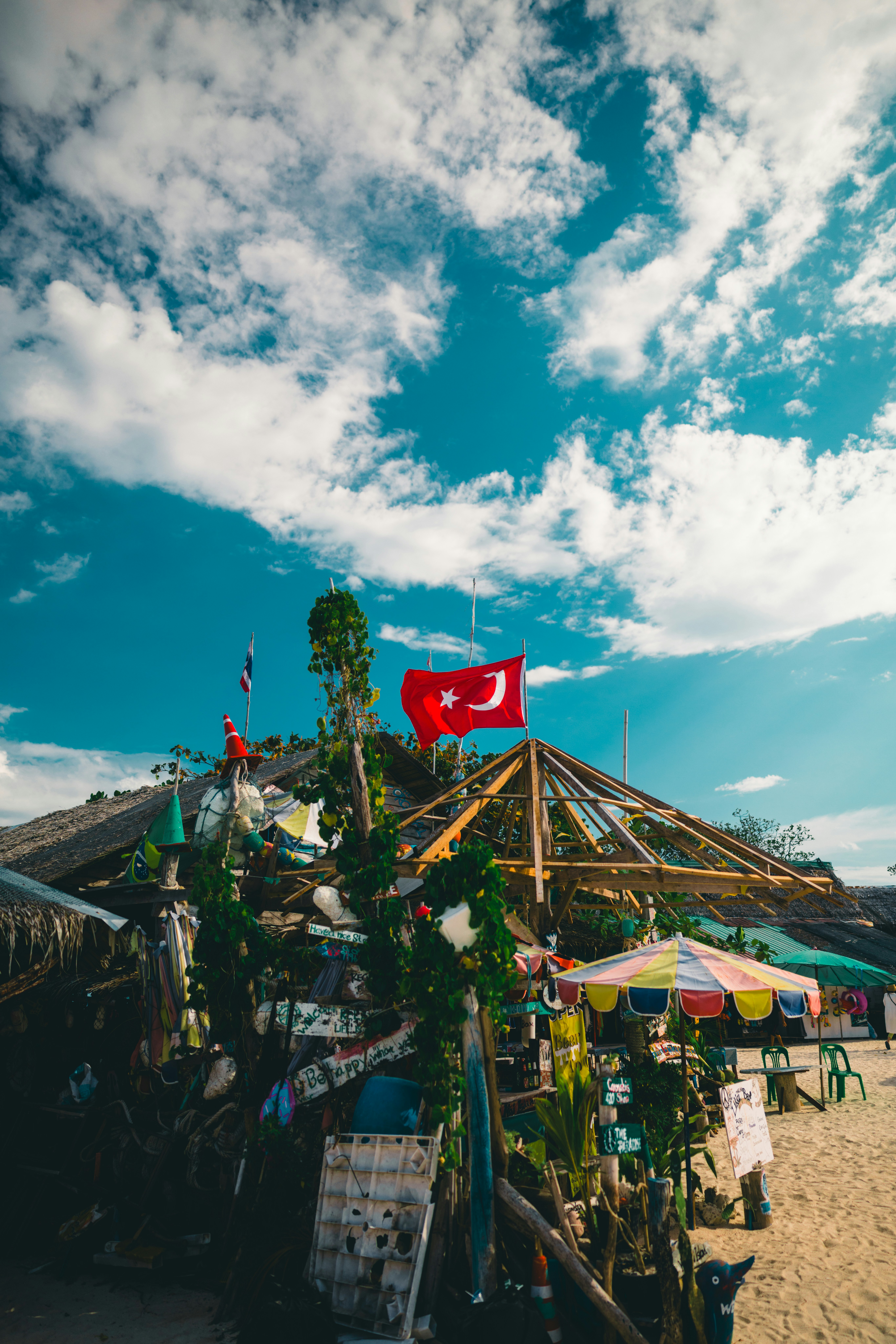 A turkish flag flies over a beach hut. photo – Free Forest Image on ...