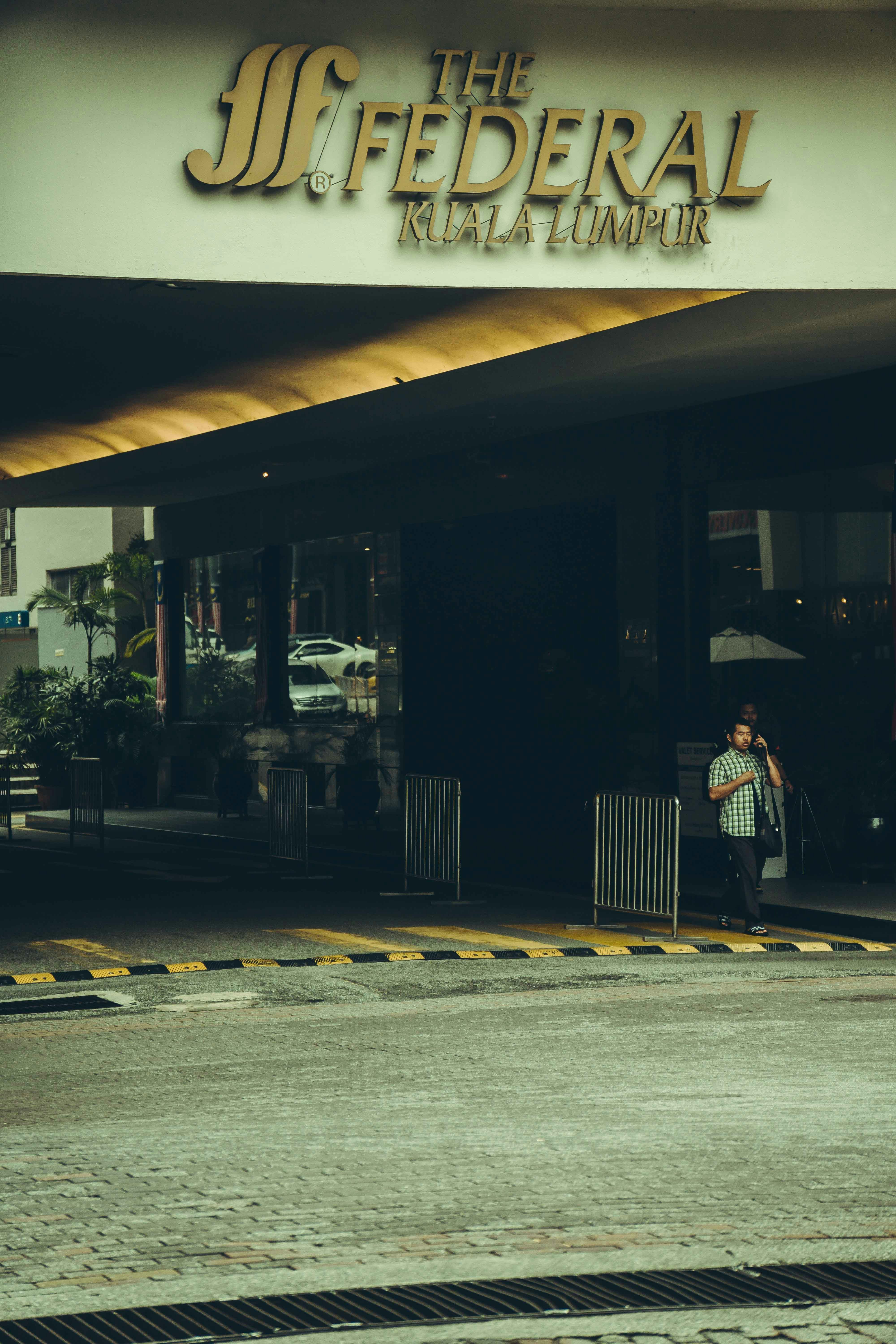 Facing The Federal: Street-Level Portrait at Kuala Lumpur's Entrance