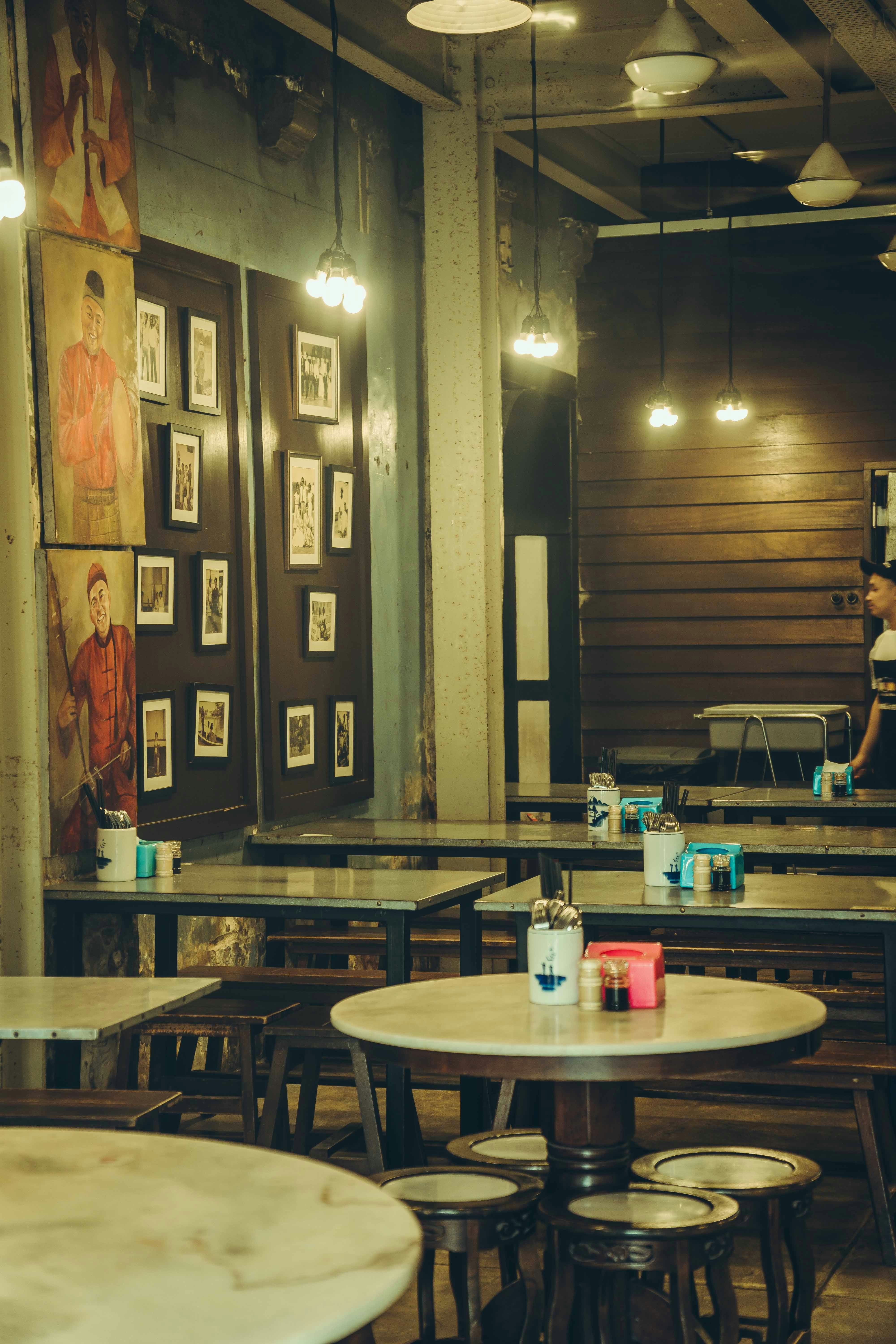 An inviting interior of a dimly lit restaurant. photo – Free Food Image ...