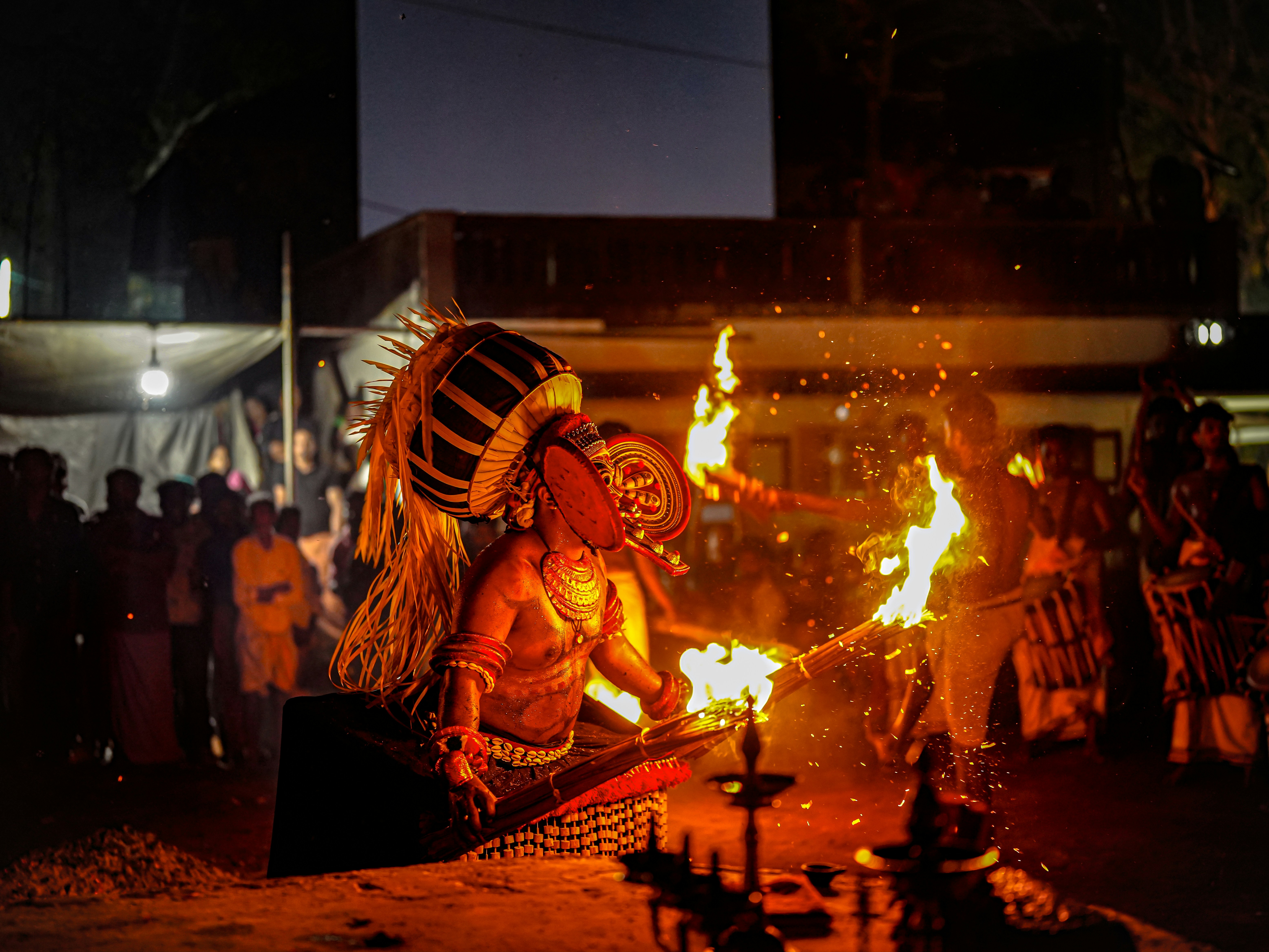 A traditional indian dance performance with fire and lights. photo ...