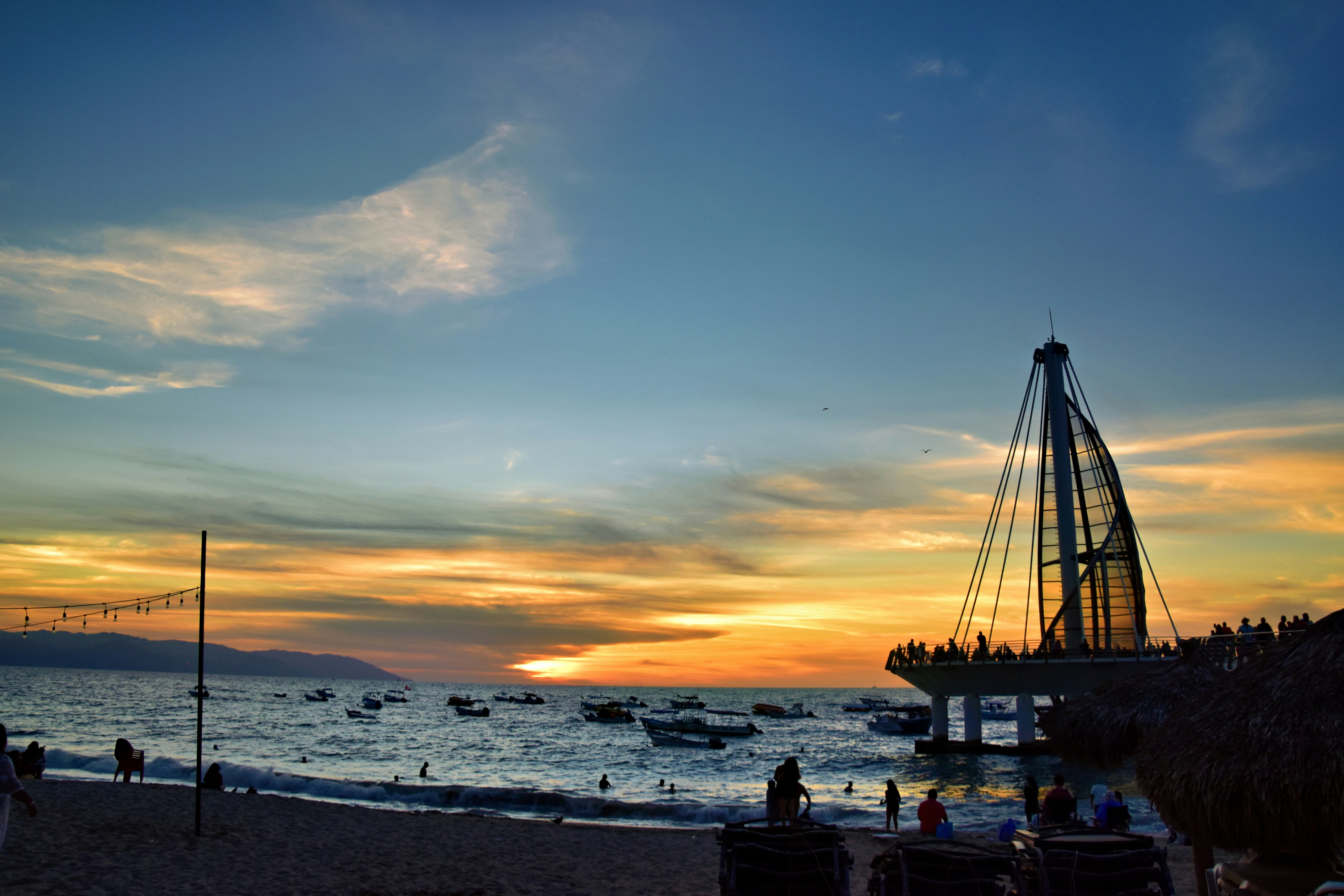 Twilight Silhouettes by the Pier