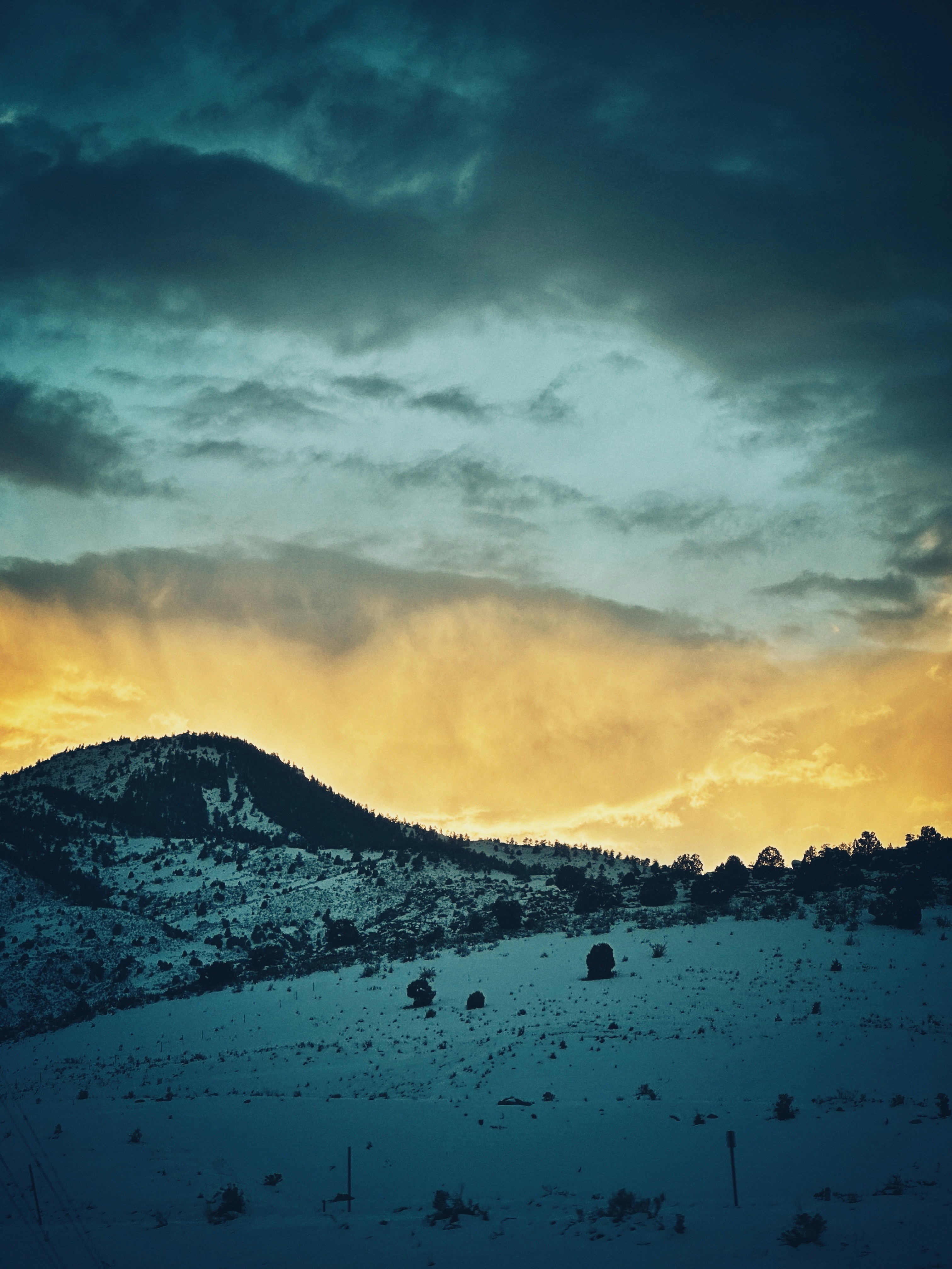 Twilight Glow Over Snowy Peaks