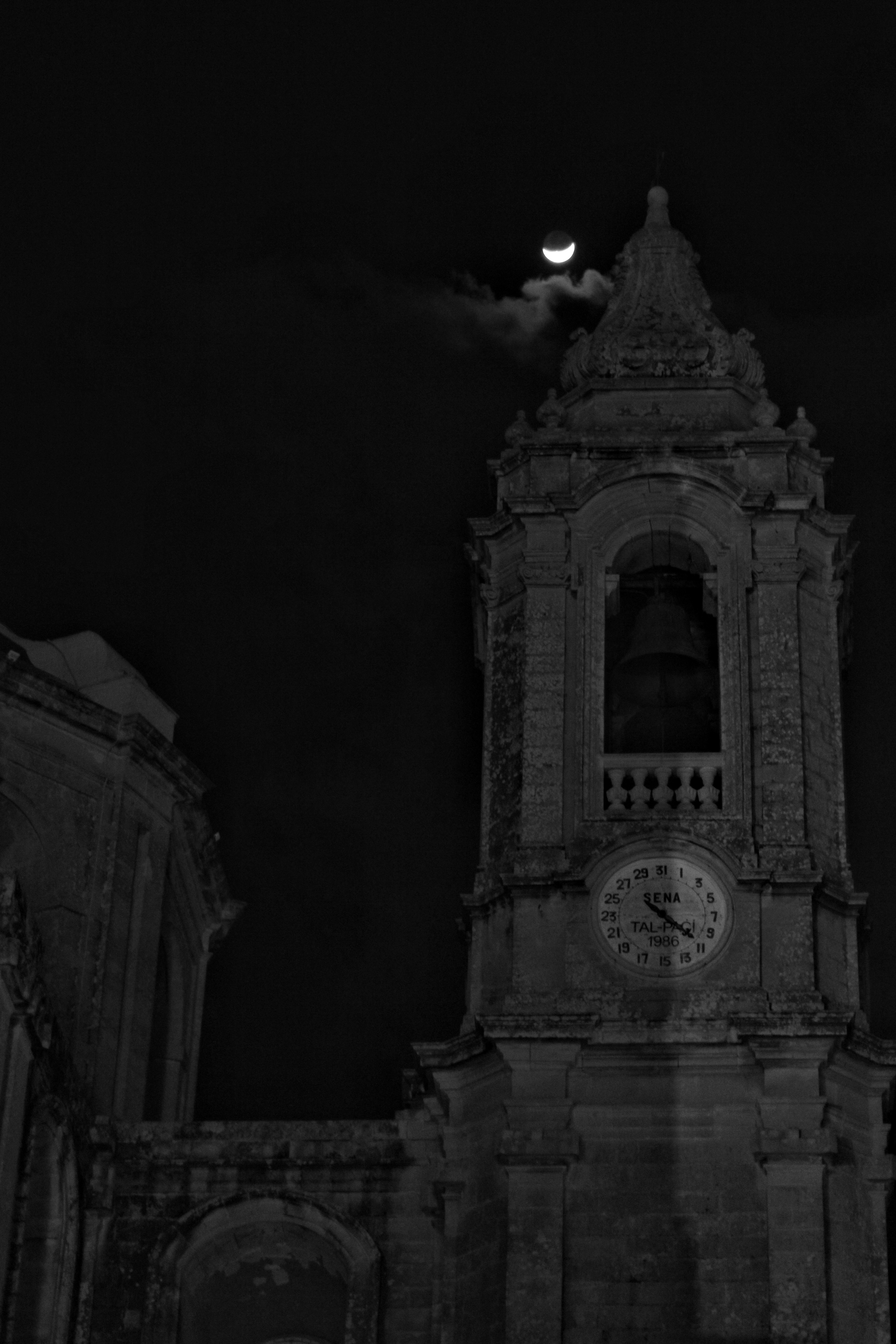 Moonlit Clock Tower Beneath a Silent Night Sky