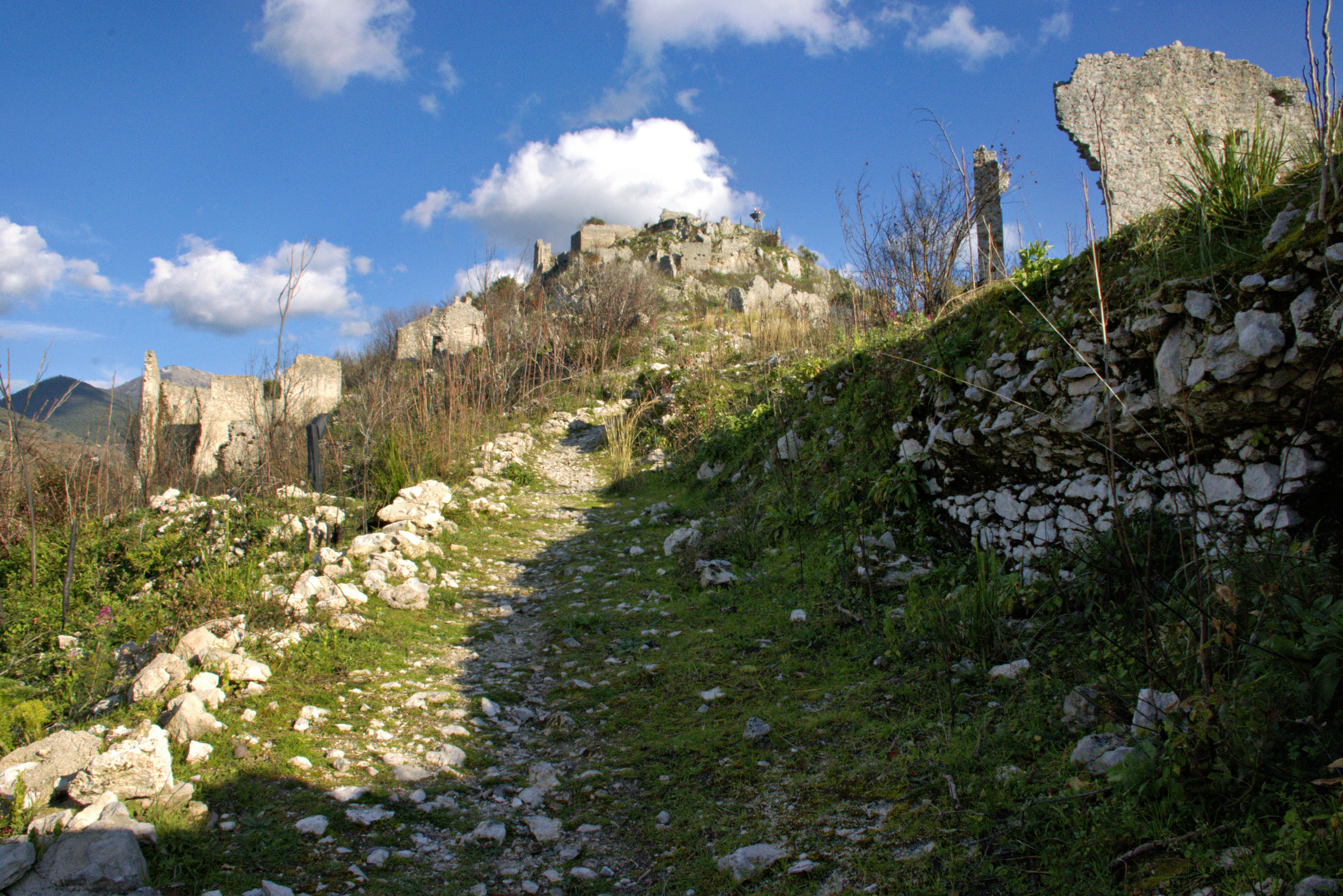 Ruins of an old stone path on a sunny day. photo – Free Road Image on ...