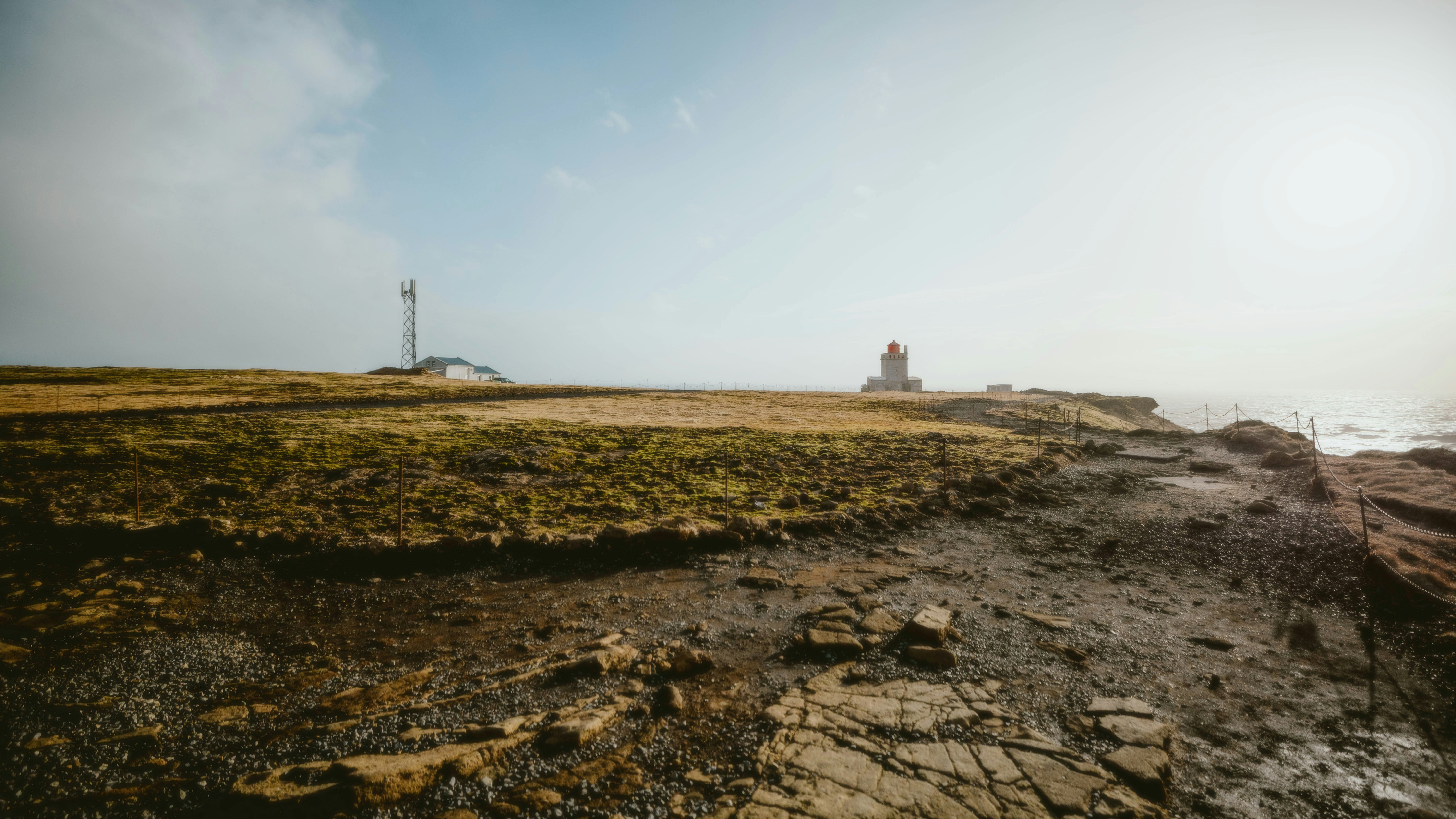 Two lighthouses stand on the rugged coastline. photo – Free Land Image ...