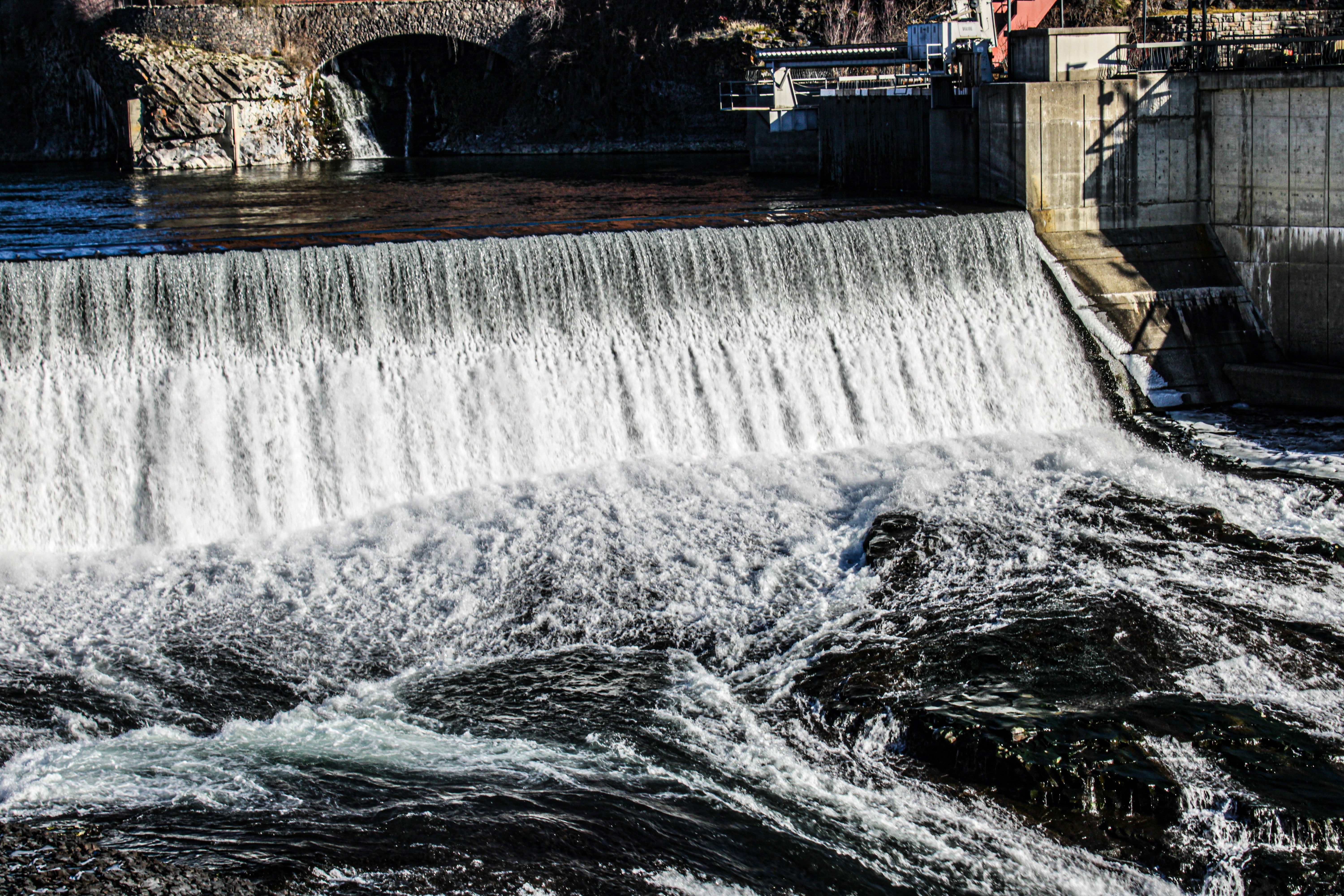 Rushing Waters Over Concrete Cascade