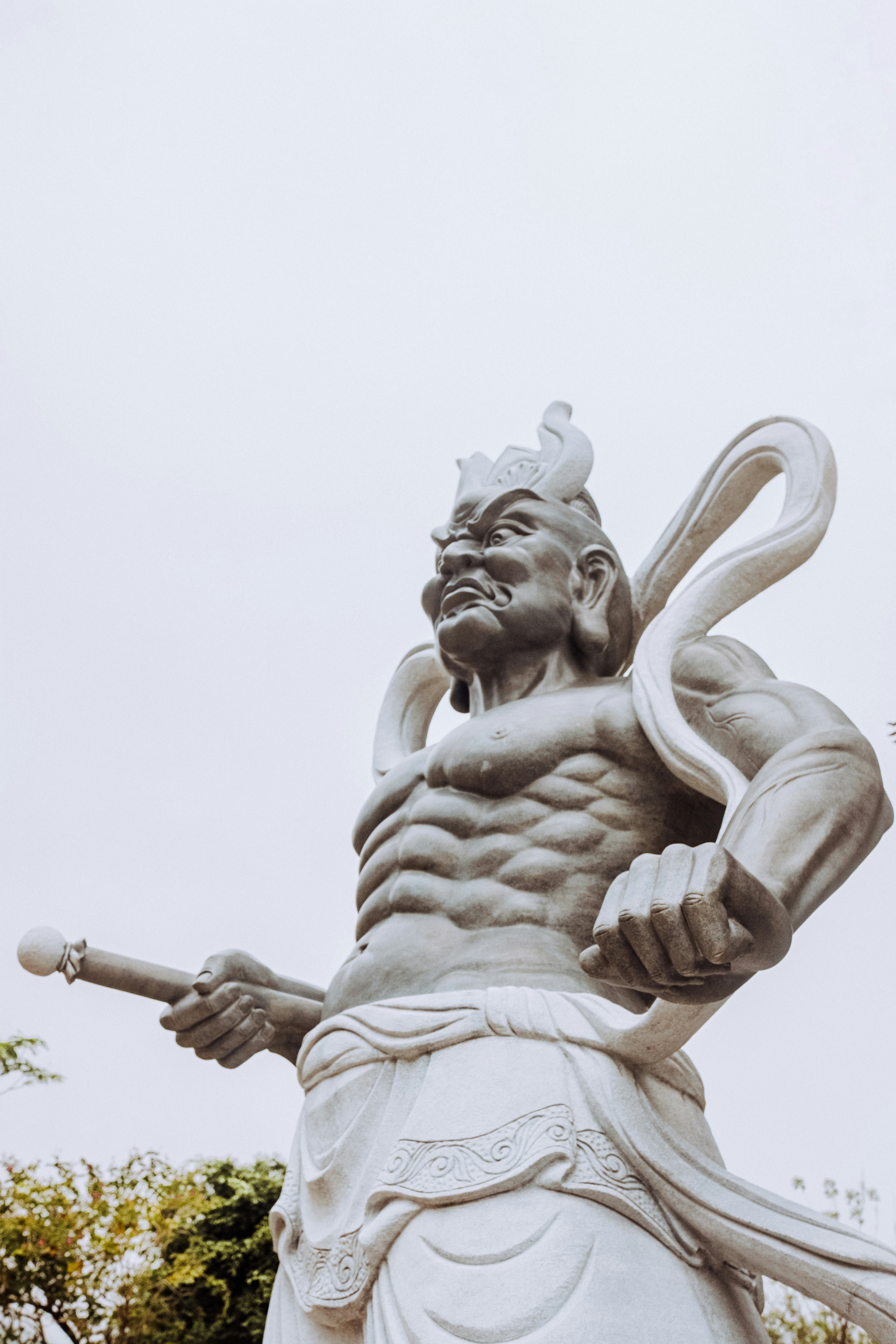 Statue of a powerful, intimidating deity. photo – Free Art Image on ...