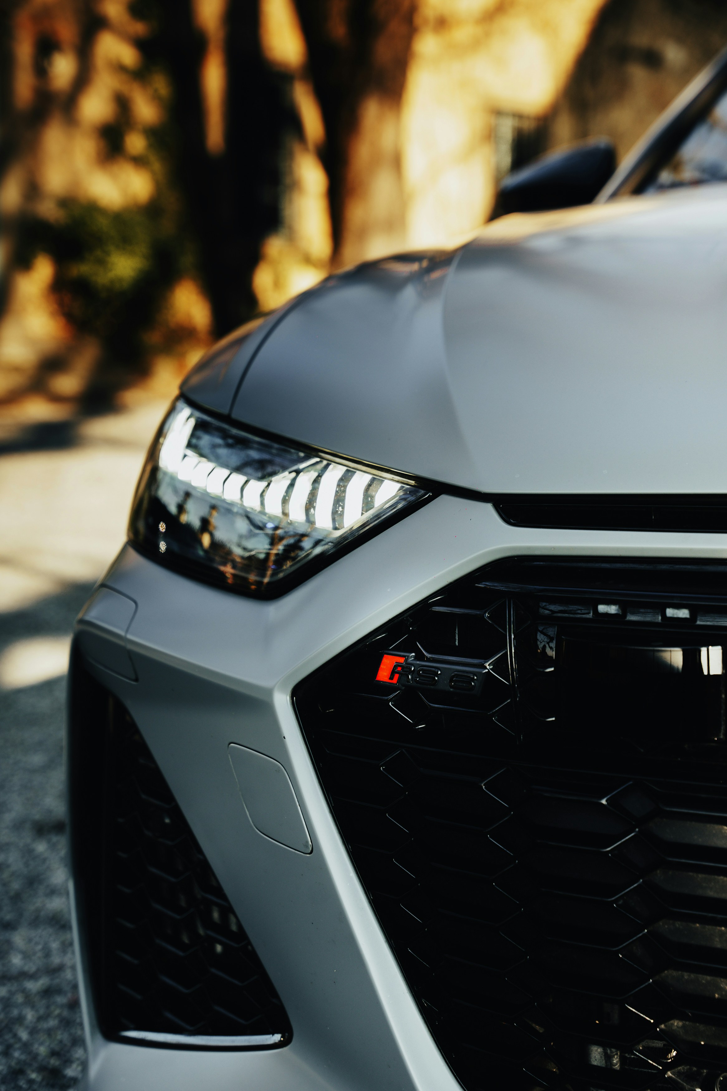 A closeup shows the front of a gray audi. photo – Free Wallpaper for ...