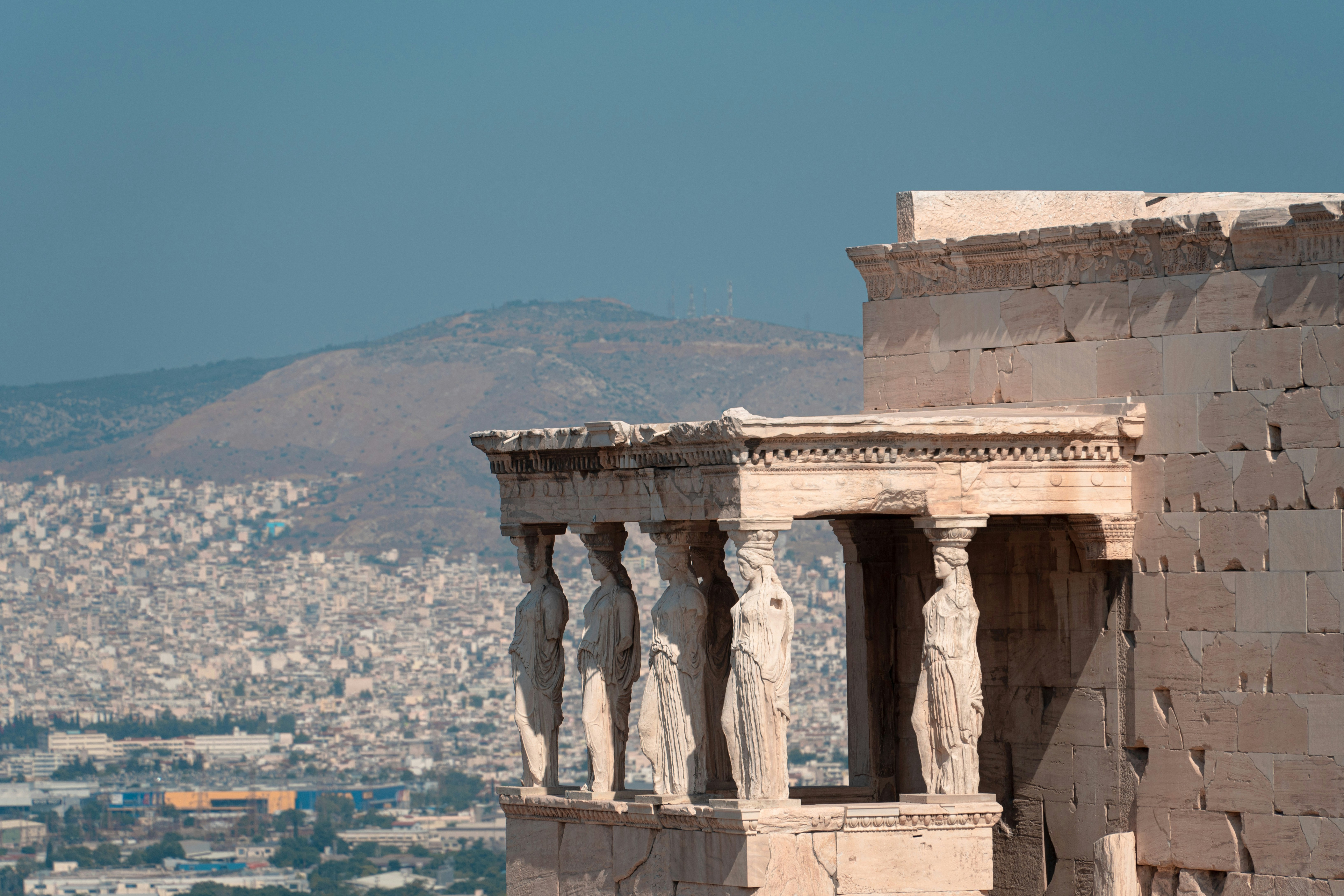 The erechtheion on the acropolis stands tall. photo – Free Wallpaper 4k Image on Unsplash